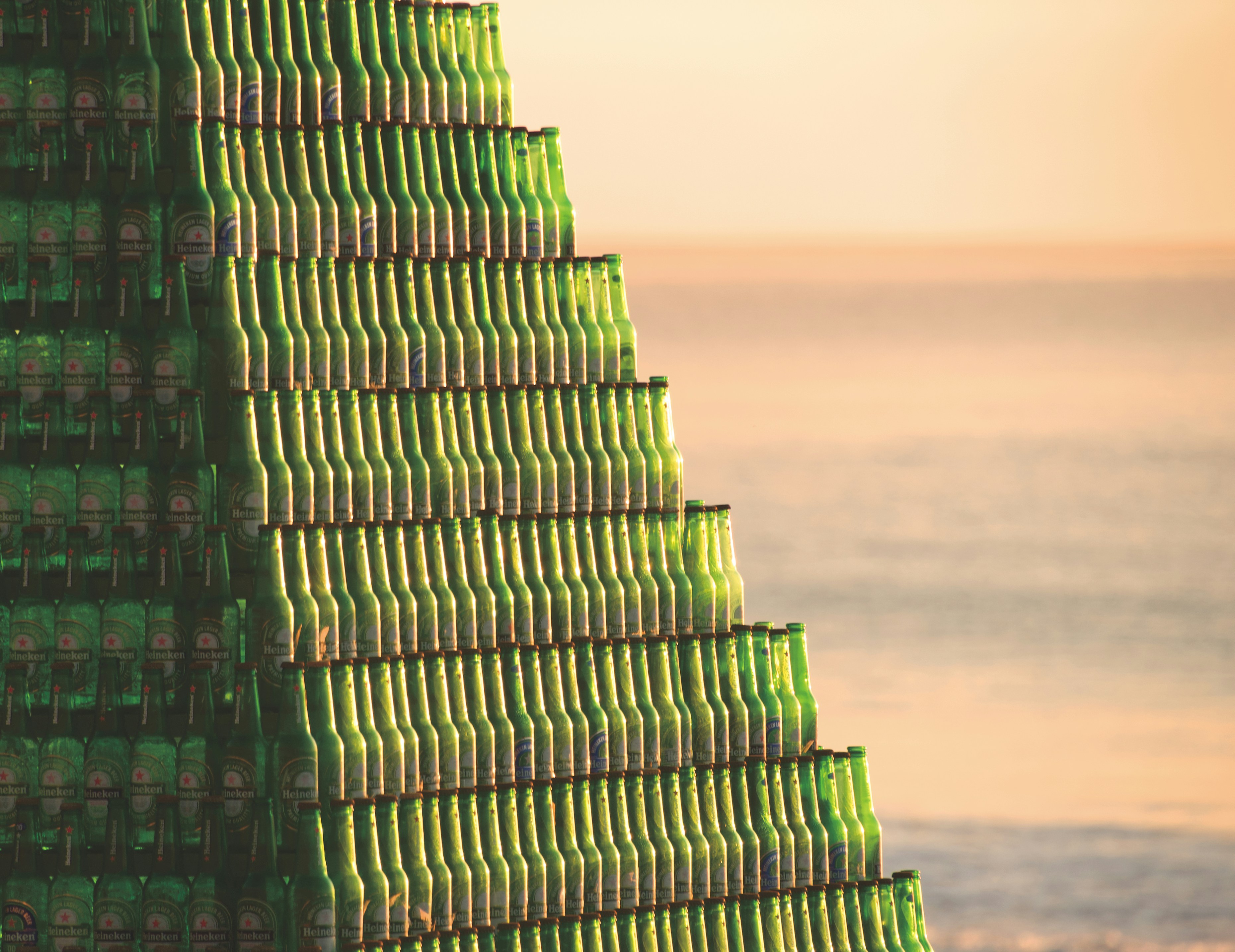 Green Bottles in a Gentle Sunset Stack