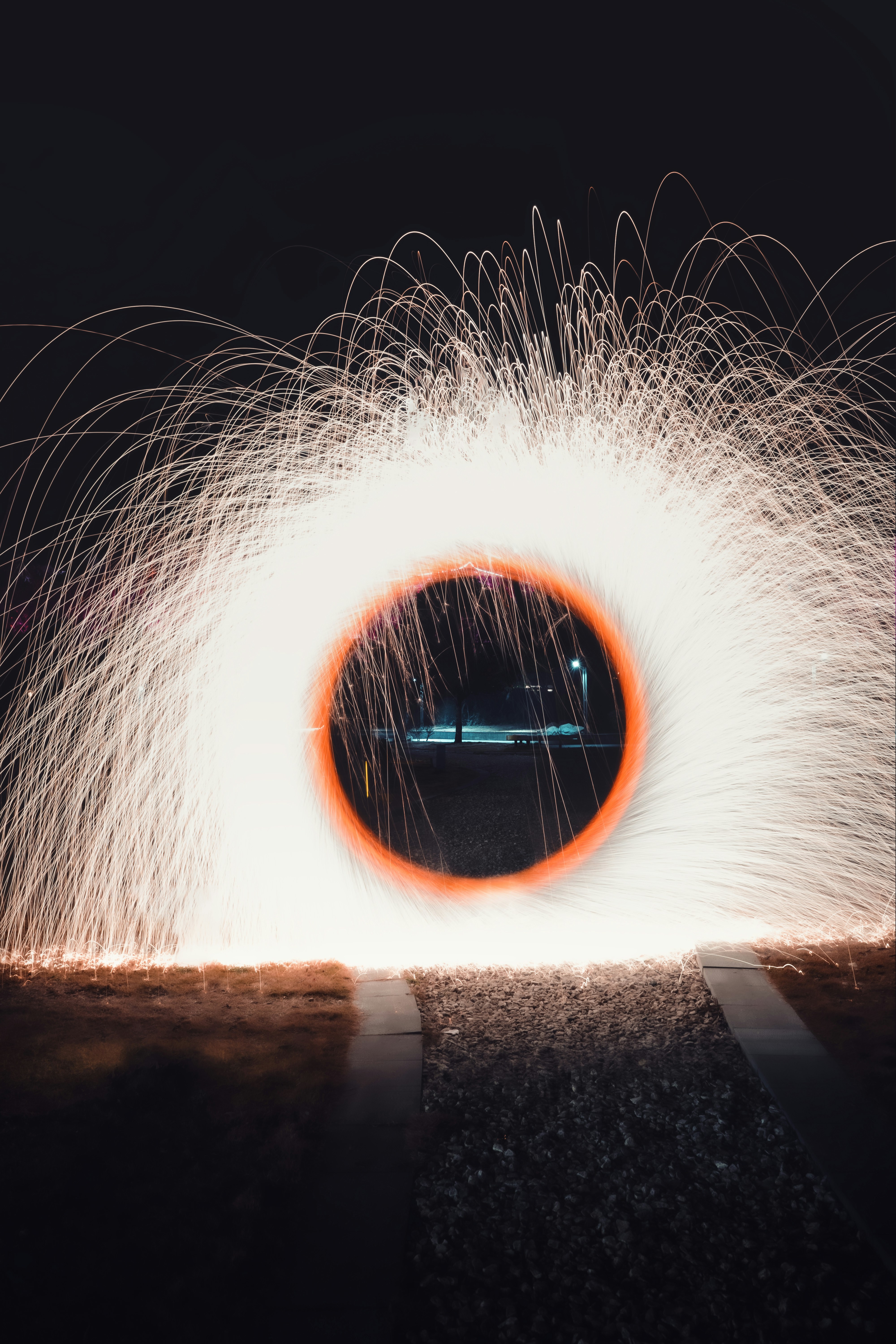 Time lapse photography of person standing on tunnel during night time ...