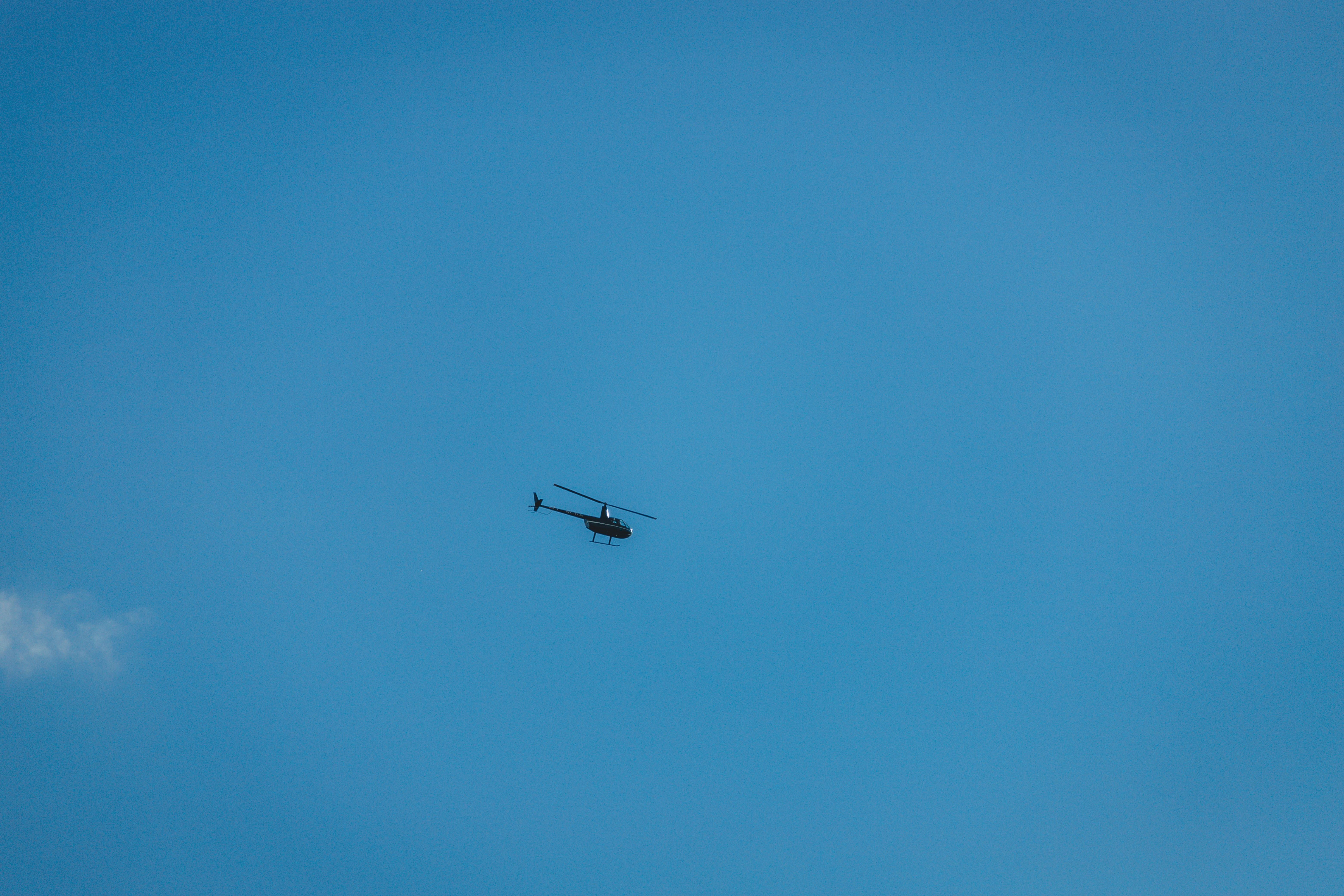 black and white airplane in mid air
