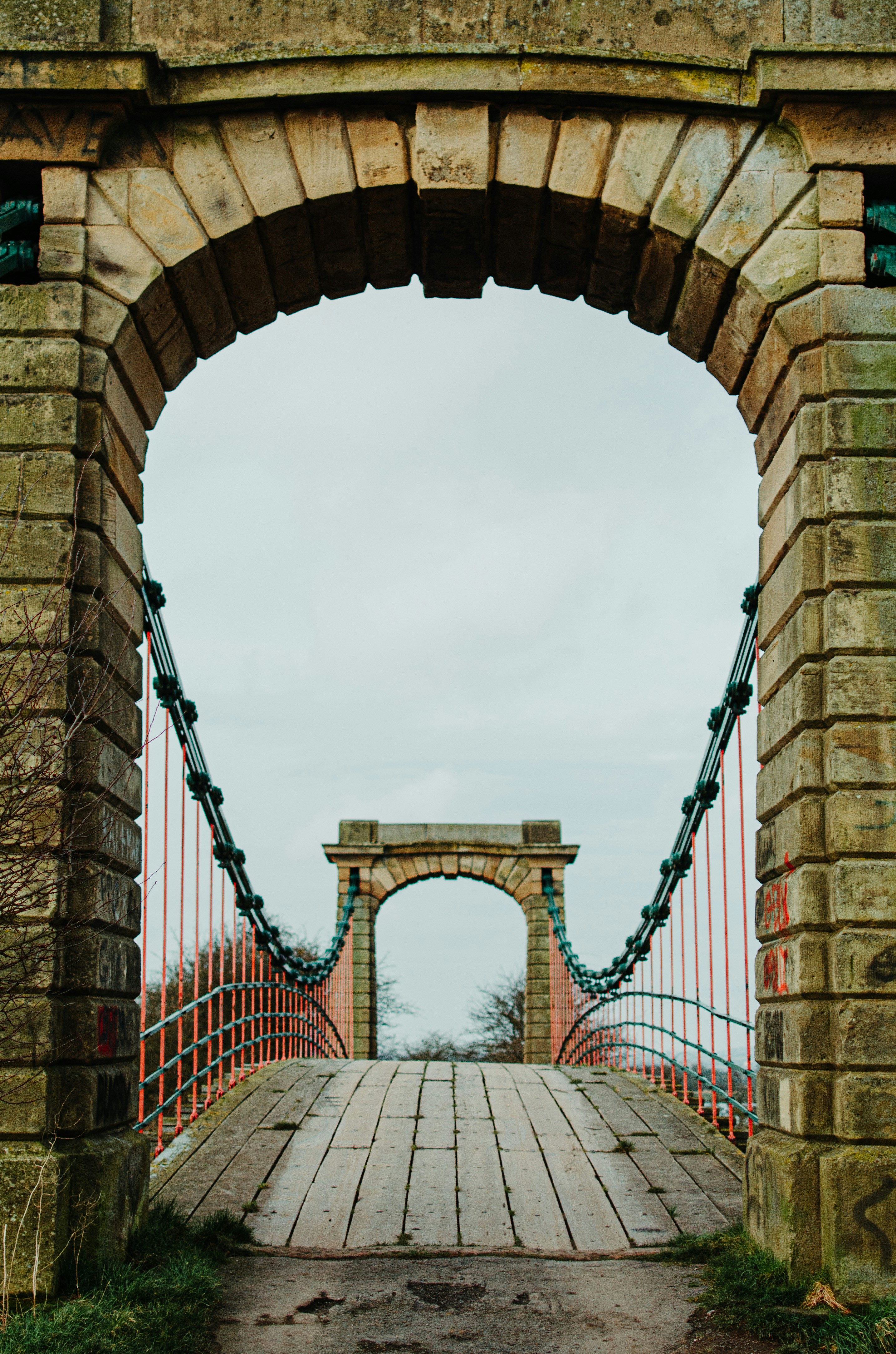 Red and green suspension bridge