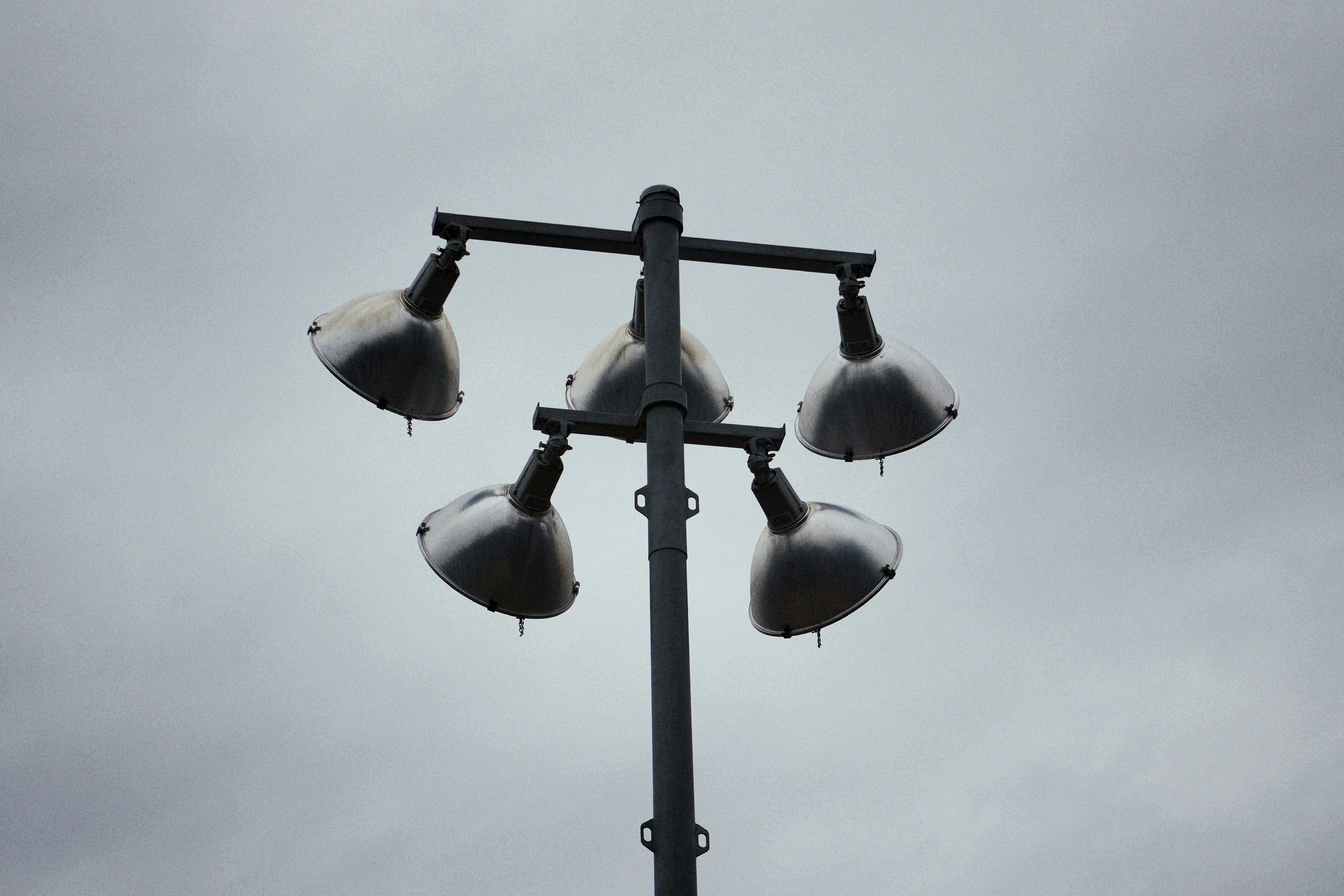 Five Lanterns Crowned by a Gray Sky: An Urban Minimalist Portrait