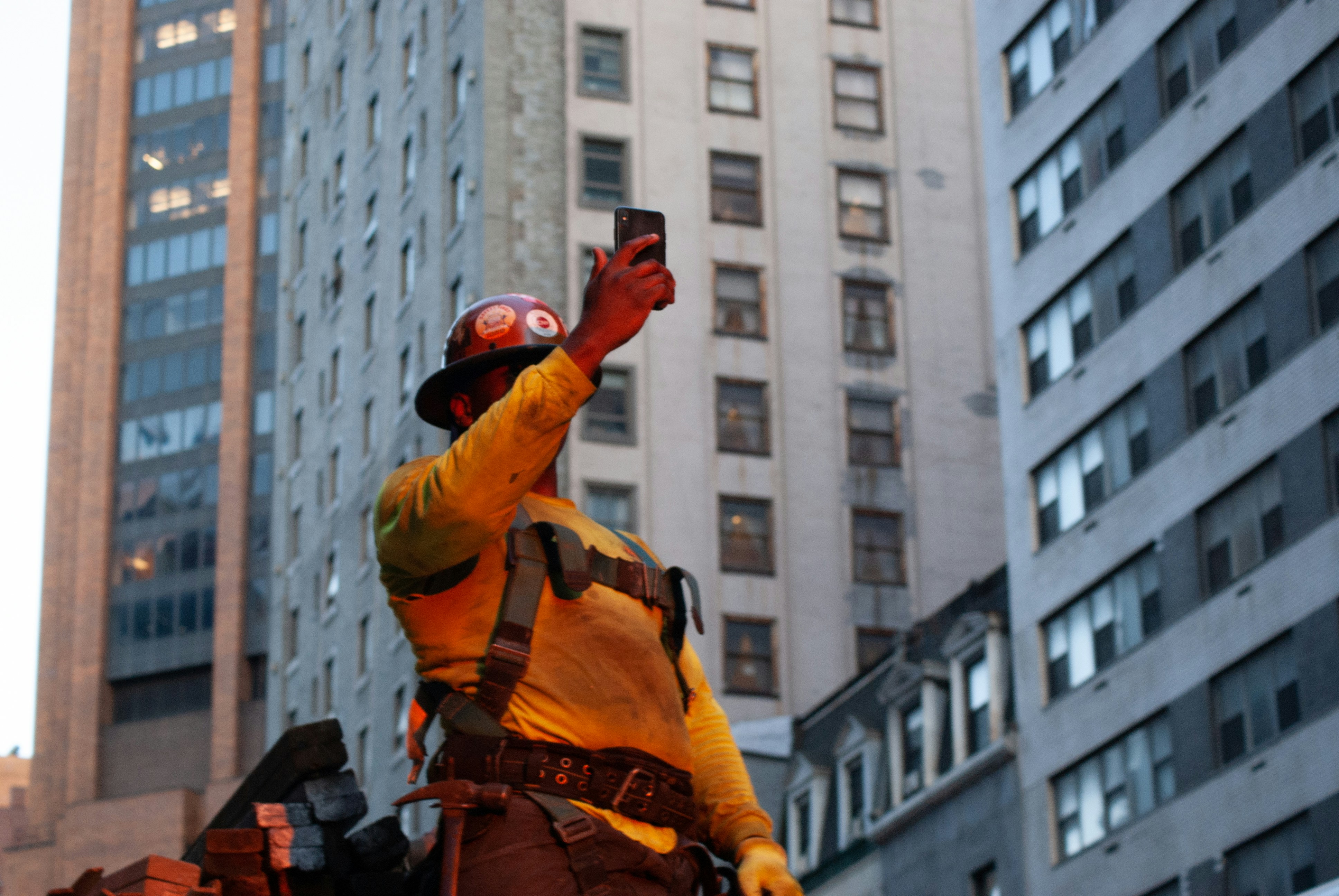 A man dressed as a construction worker taking a selfie photo – Free Building Image on Unsplash