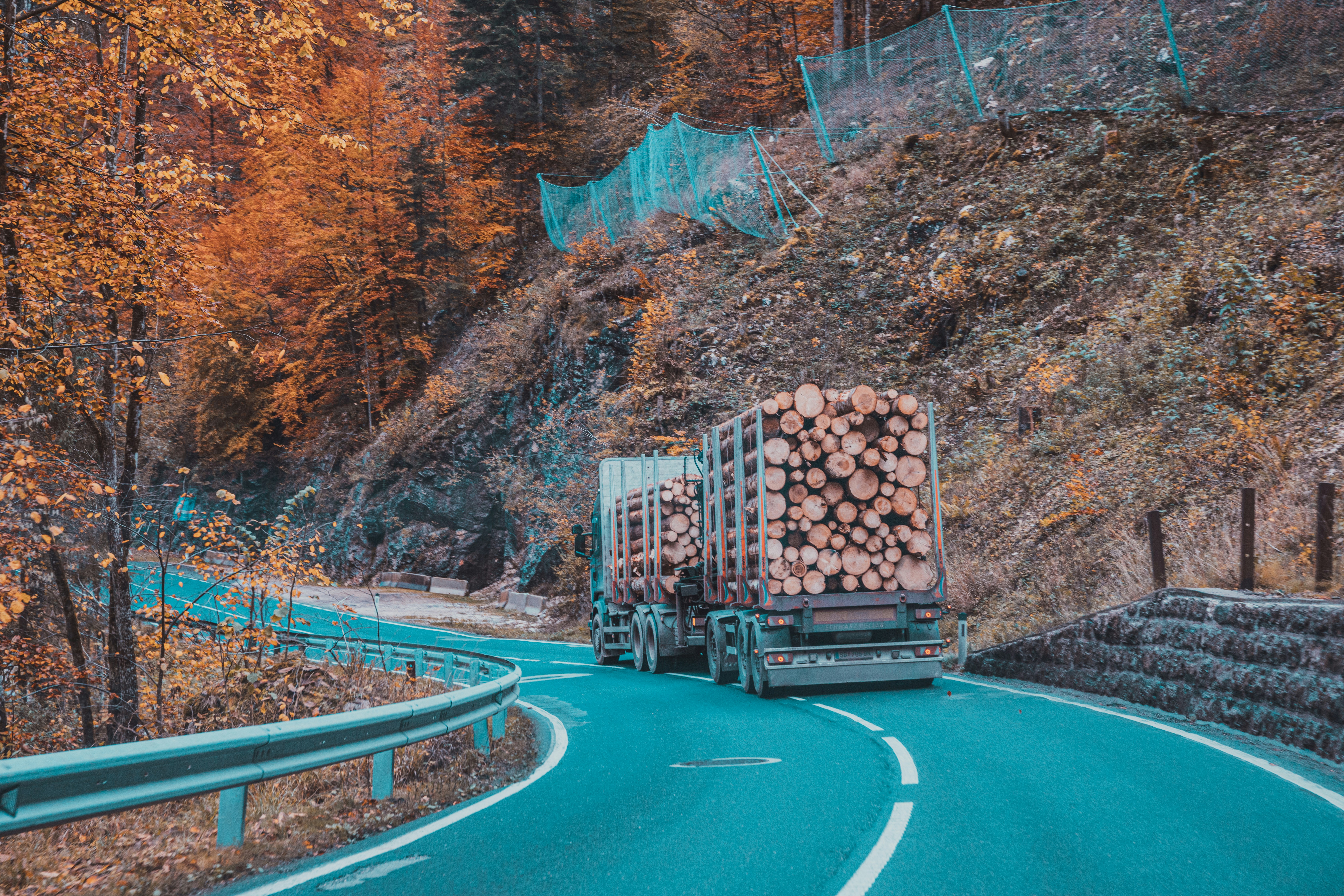 Brown wooden crates on road photo – Free Road Image on Unsplash