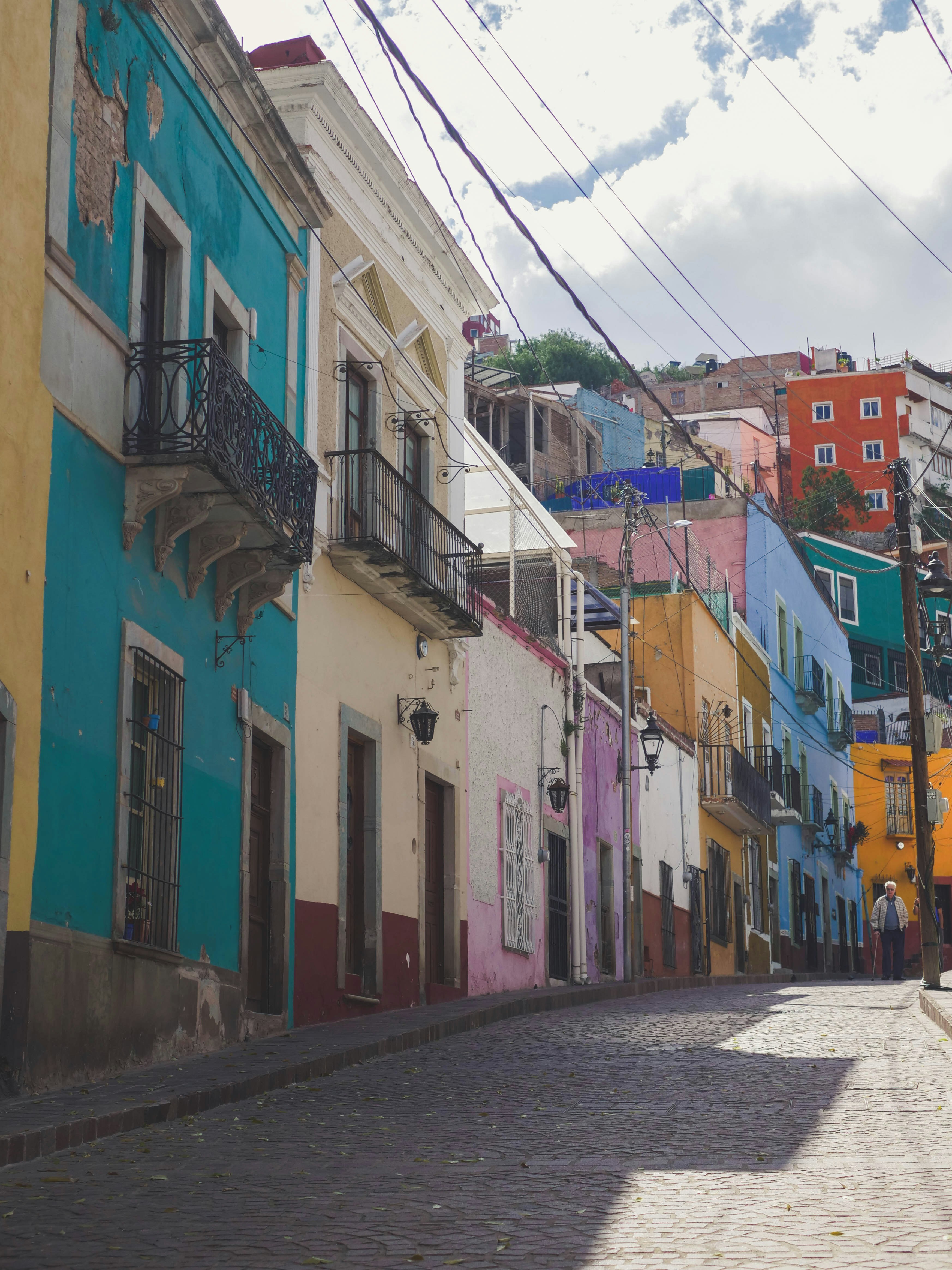 Green and yellow concrete building during daytime photo – Free Mexico ...