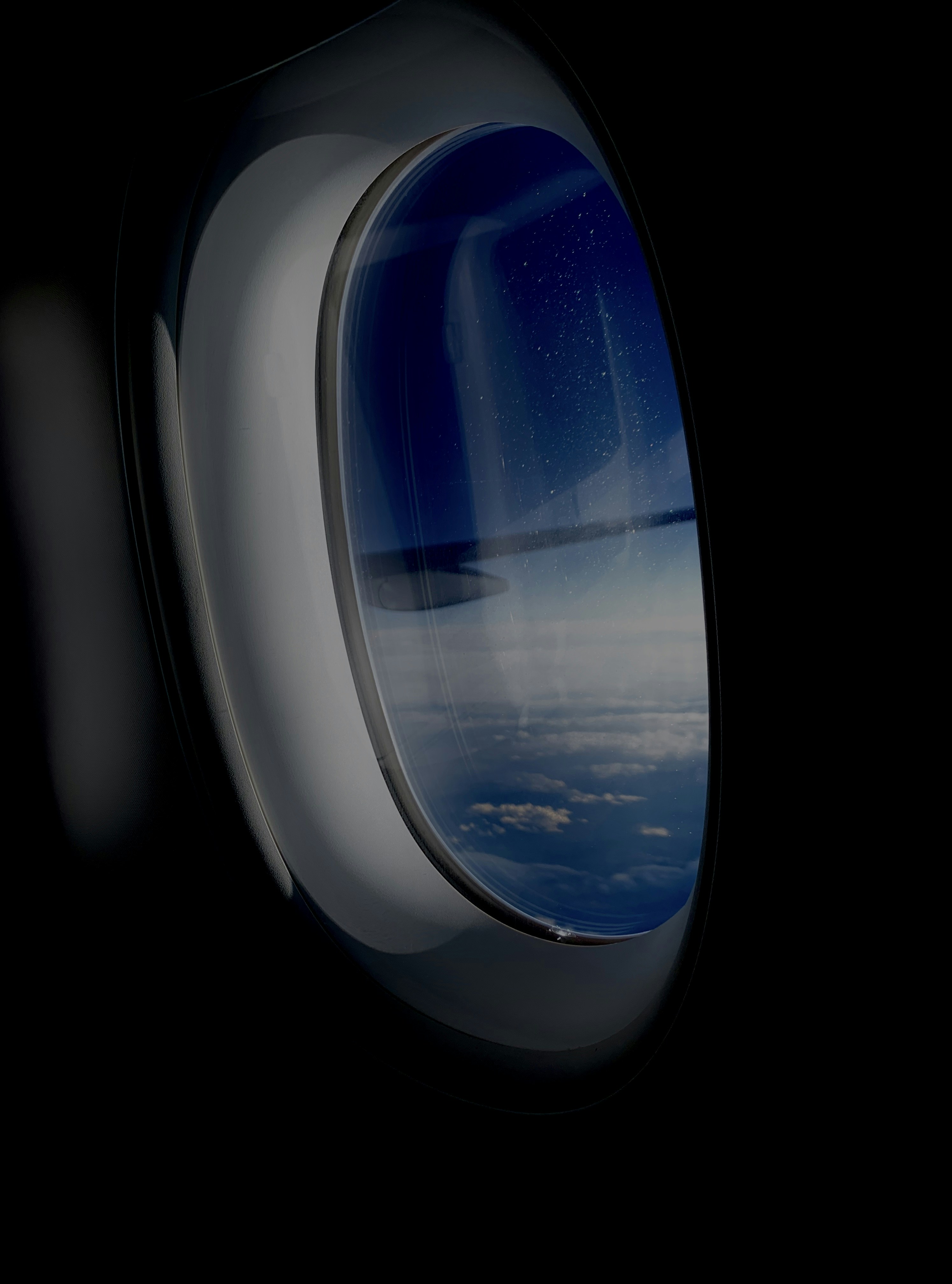 Window to the World: A Cosmic View through an Airplane Pane