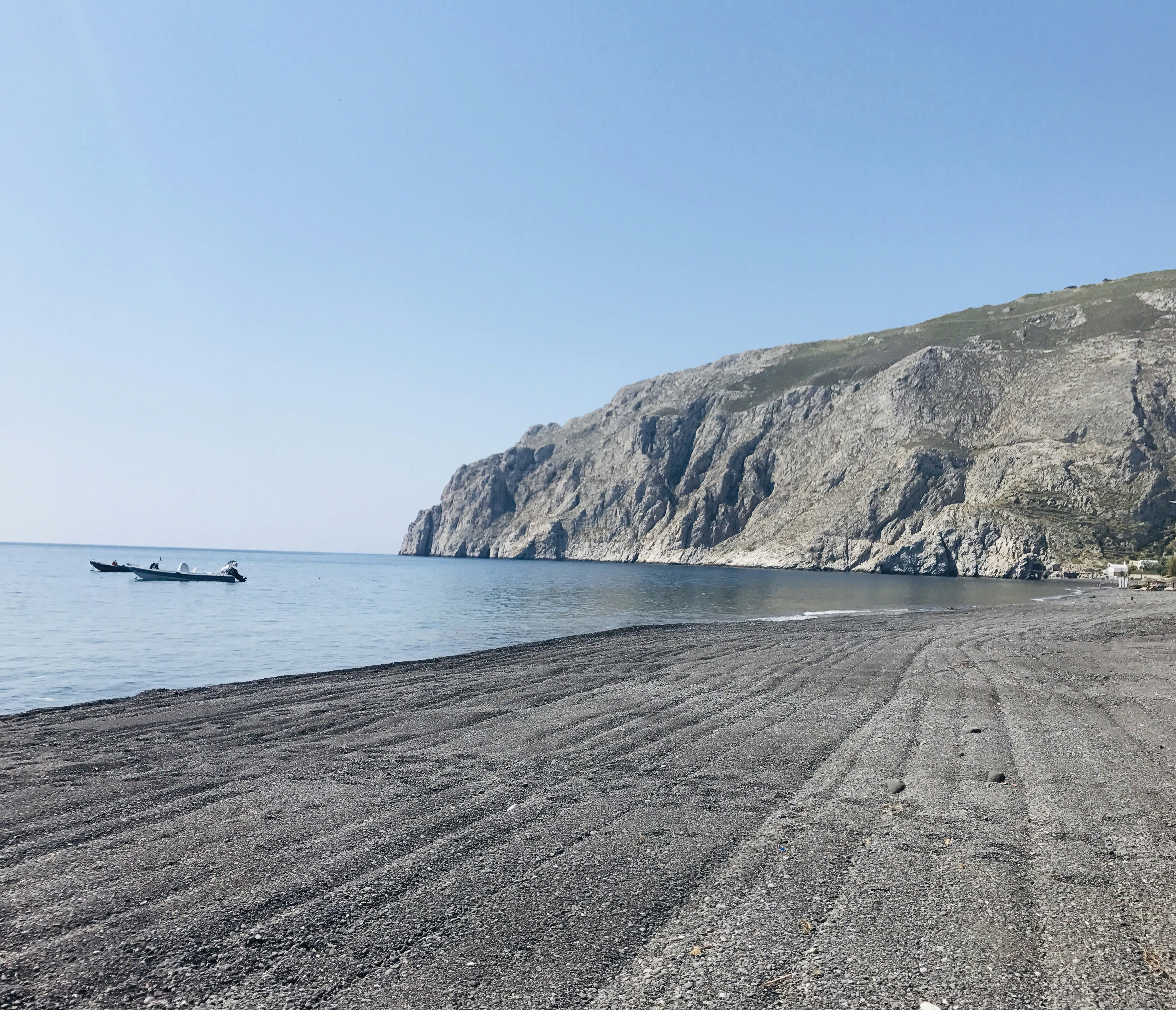 Coastal Cliffline Meets Quiet Beachfront