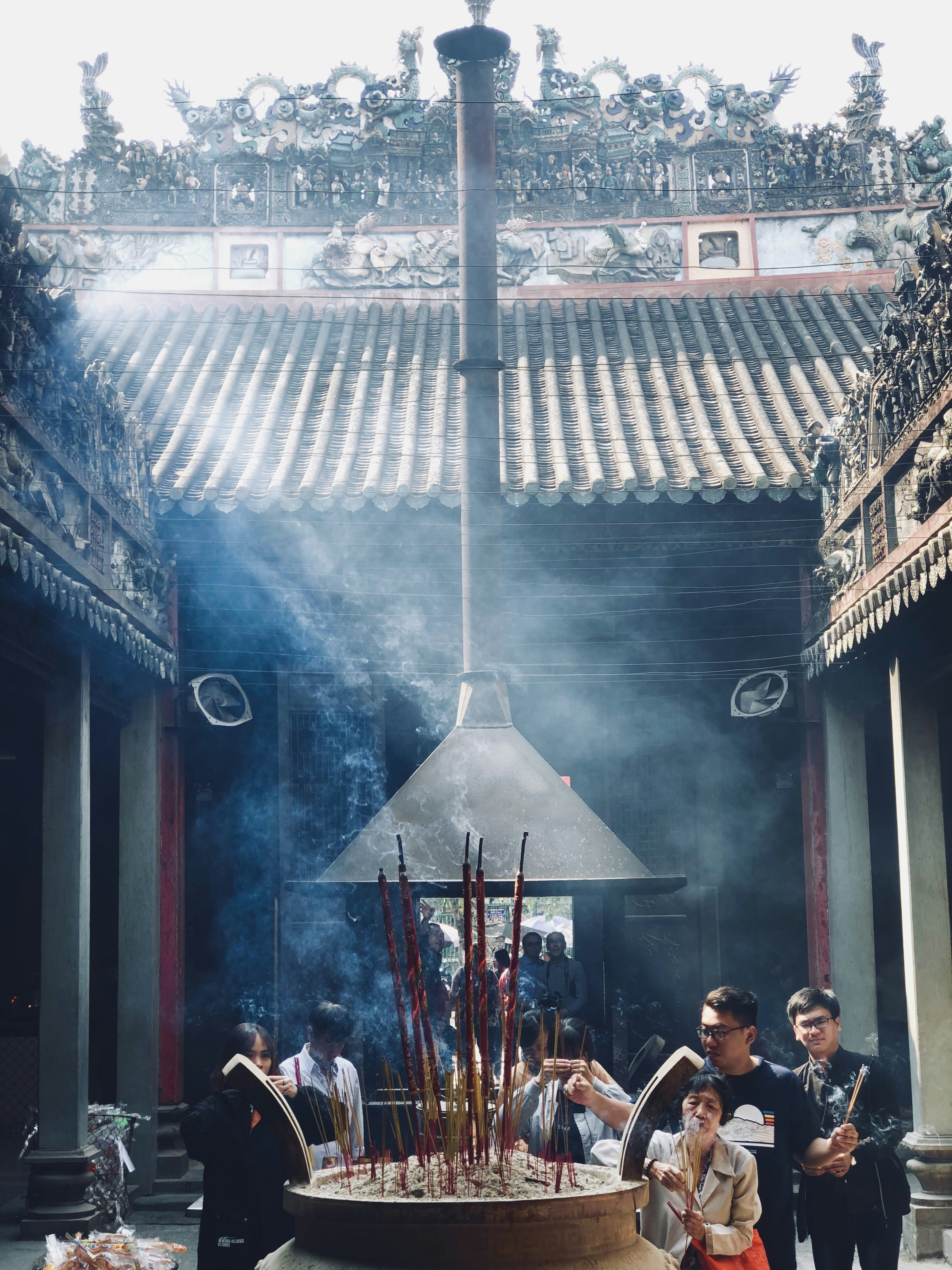 Incense Drift in a Carved Temple Courtyard