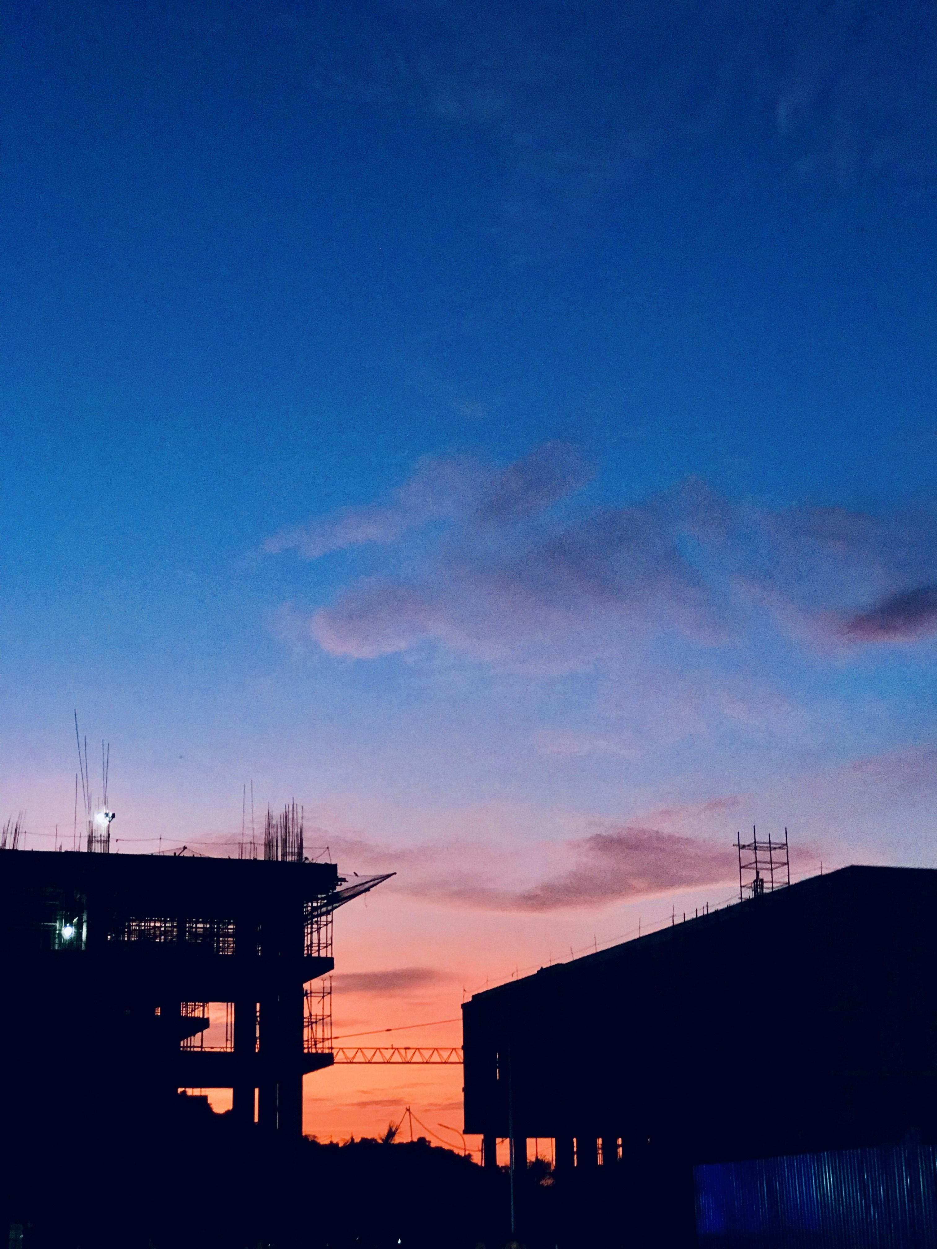 Horizon Lines: Silhouetted Construction at Dusk