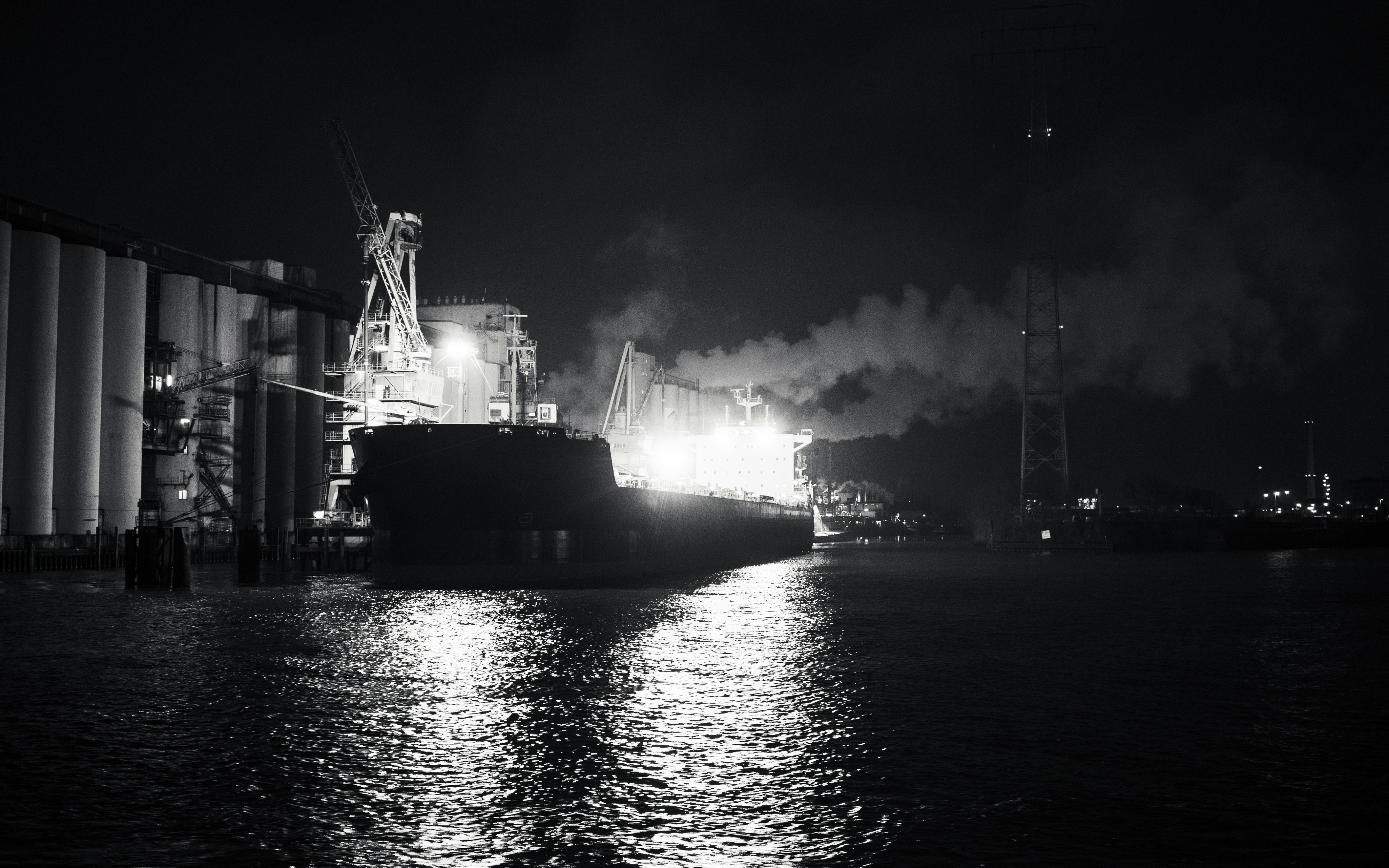 Midnight Bulk Carrier Illuminated at a Quiet Harbor