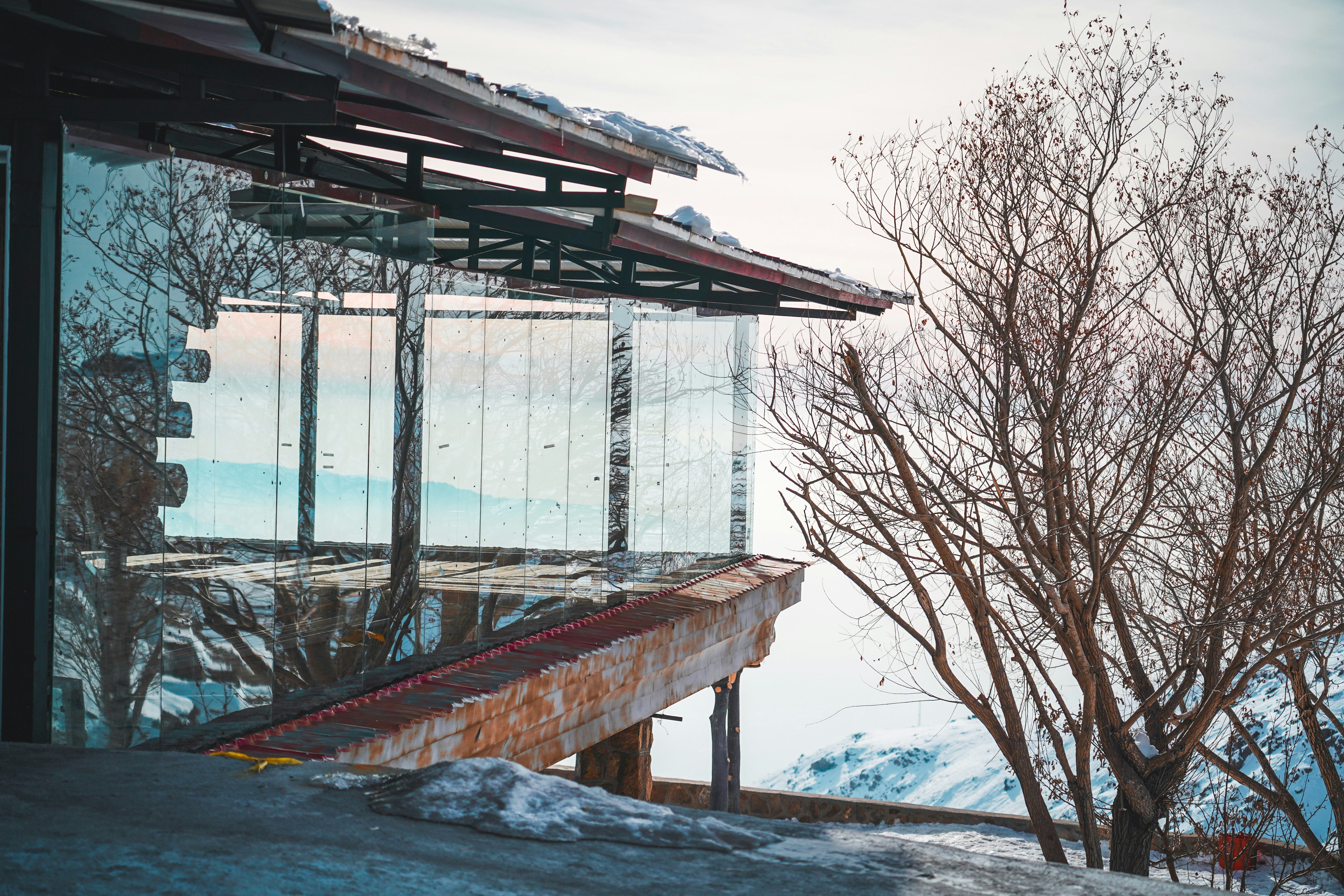 Edge of Glass: Winter Light on a Cliffside Pavilion