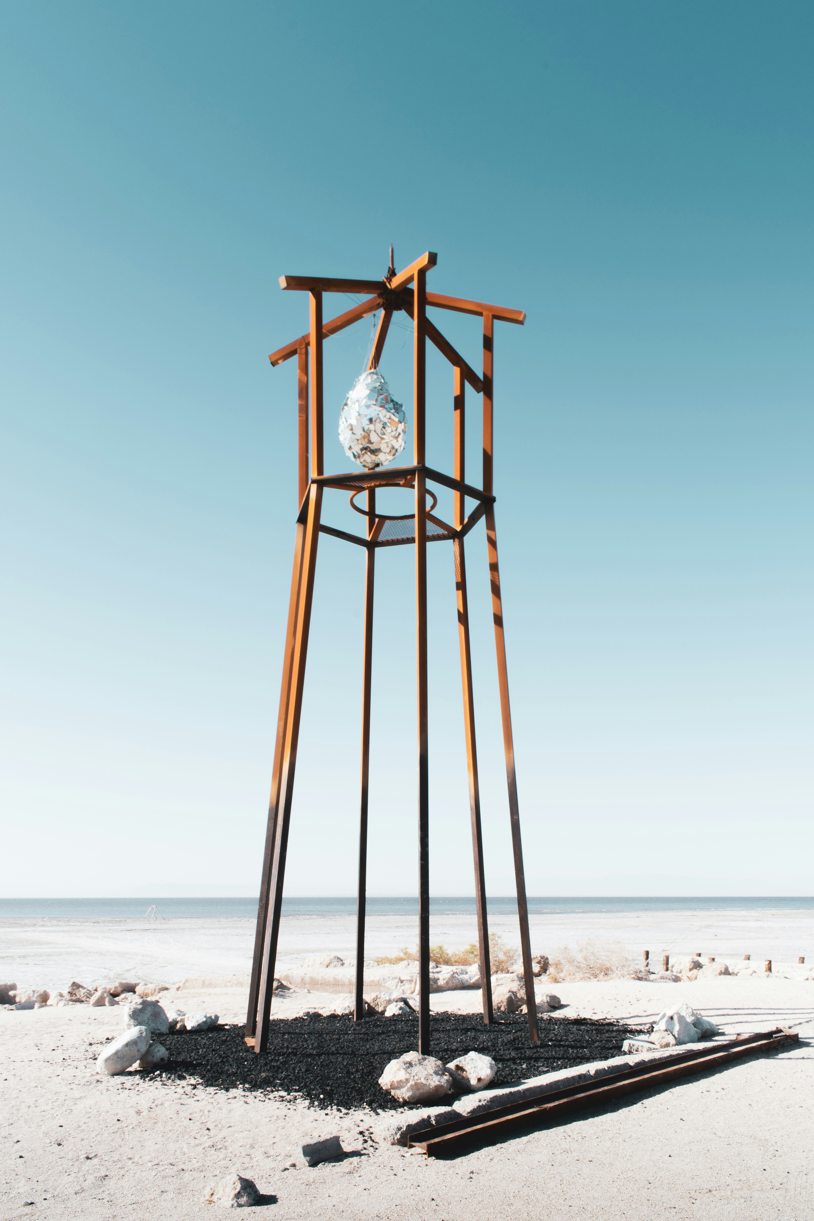 Mirrored Ember on a Coastal Spire