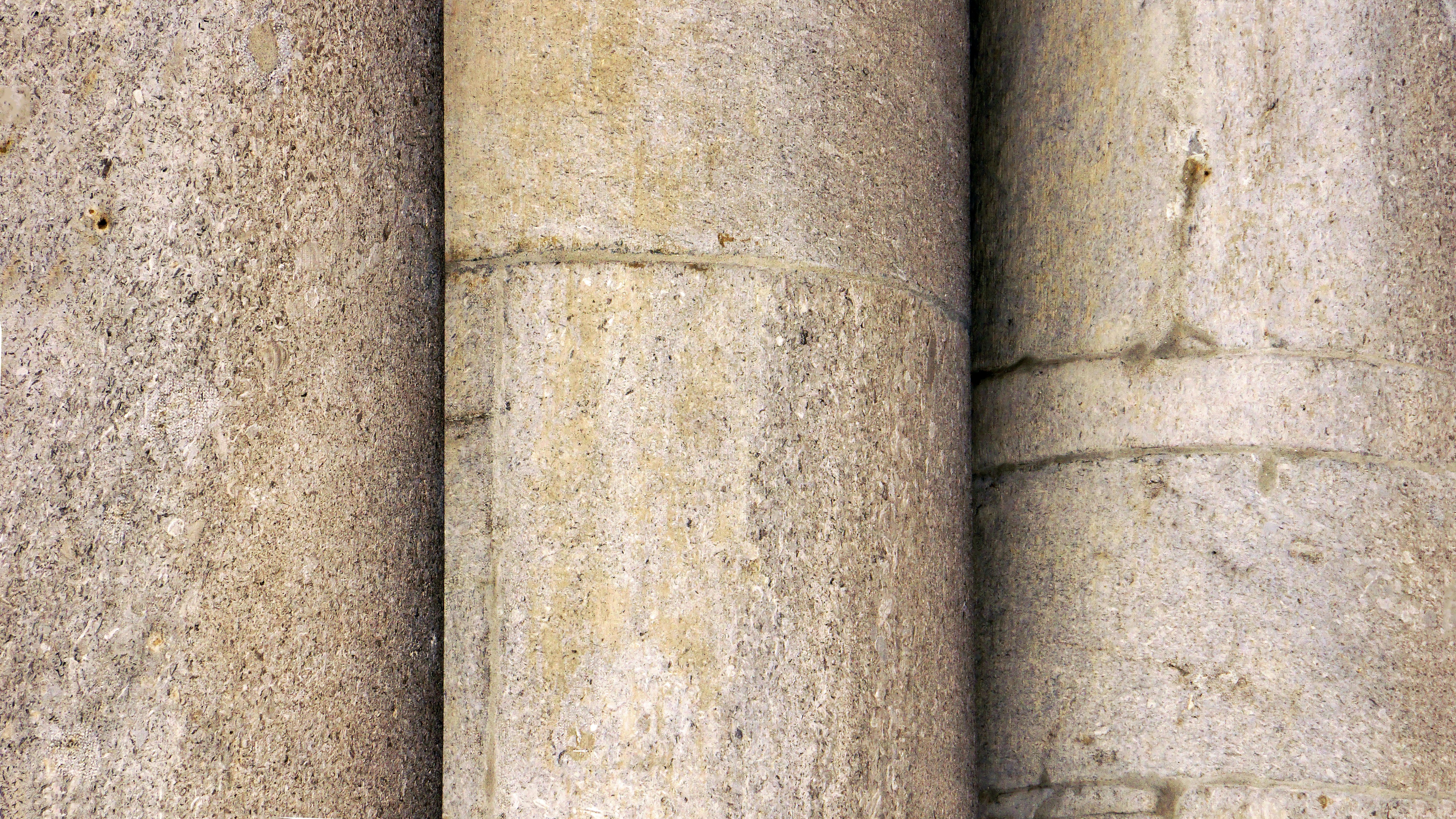 Stone Pillars in a Quiet Corridor