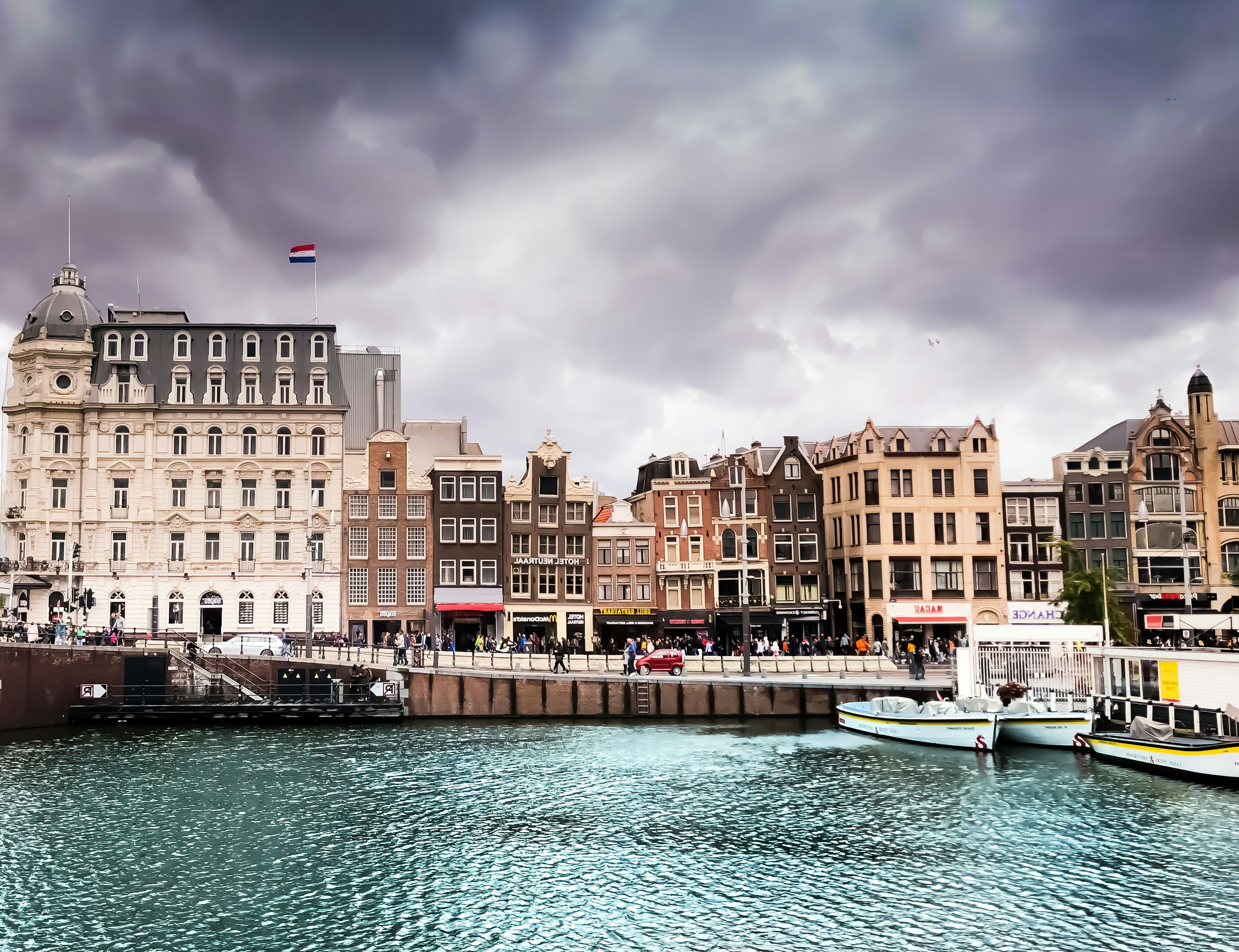 There are two doves over the building on left corner