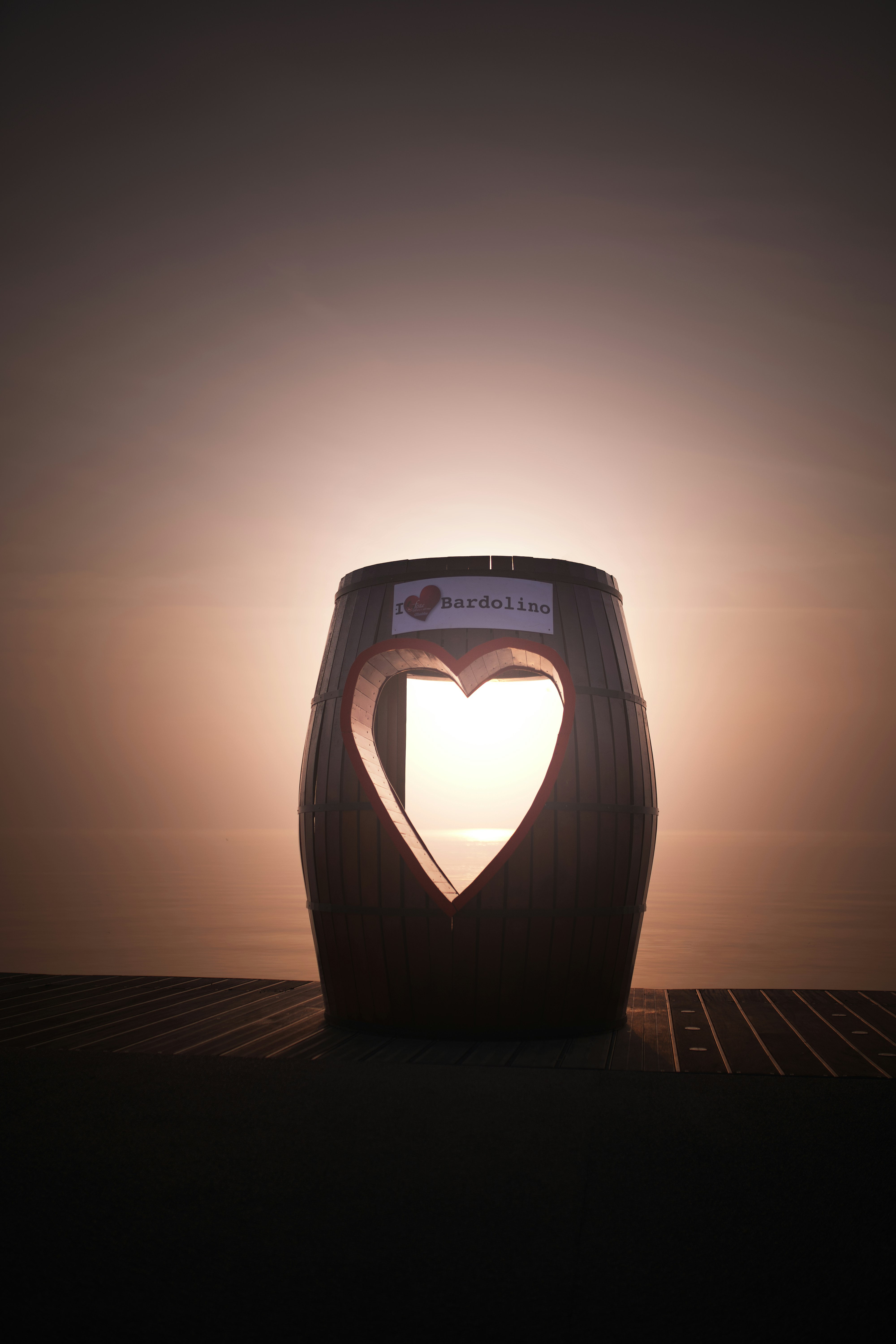 Heart of Light: Sunset Barrel by the Pier