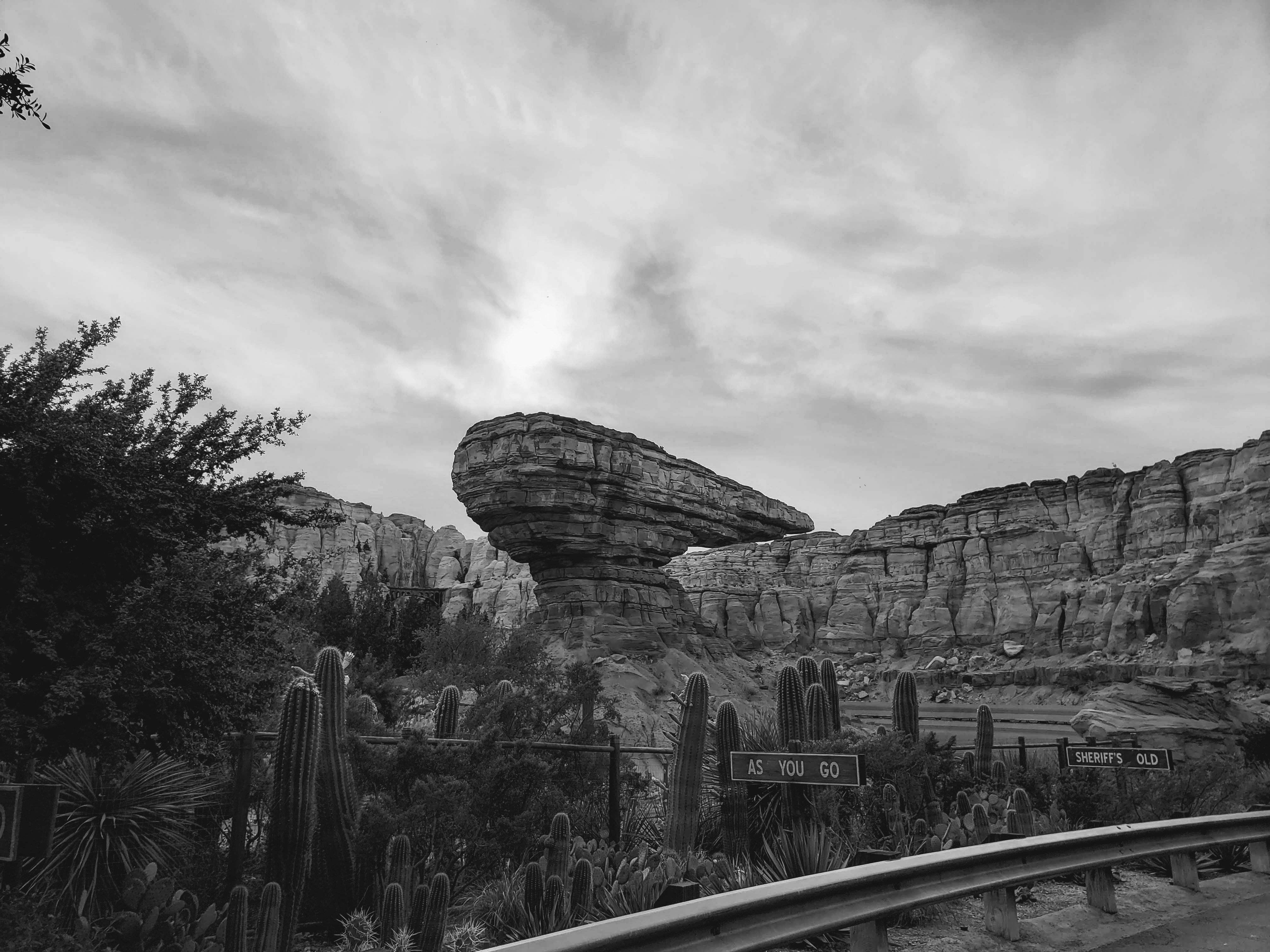 Balancing Rock Over a Quiet Desert Rail