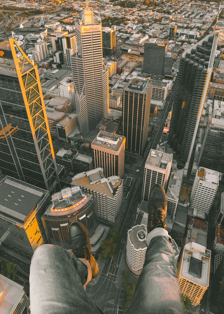 Instagram: @harry.digital Perth City from a Helicopter perspective | yellow and black tower crane