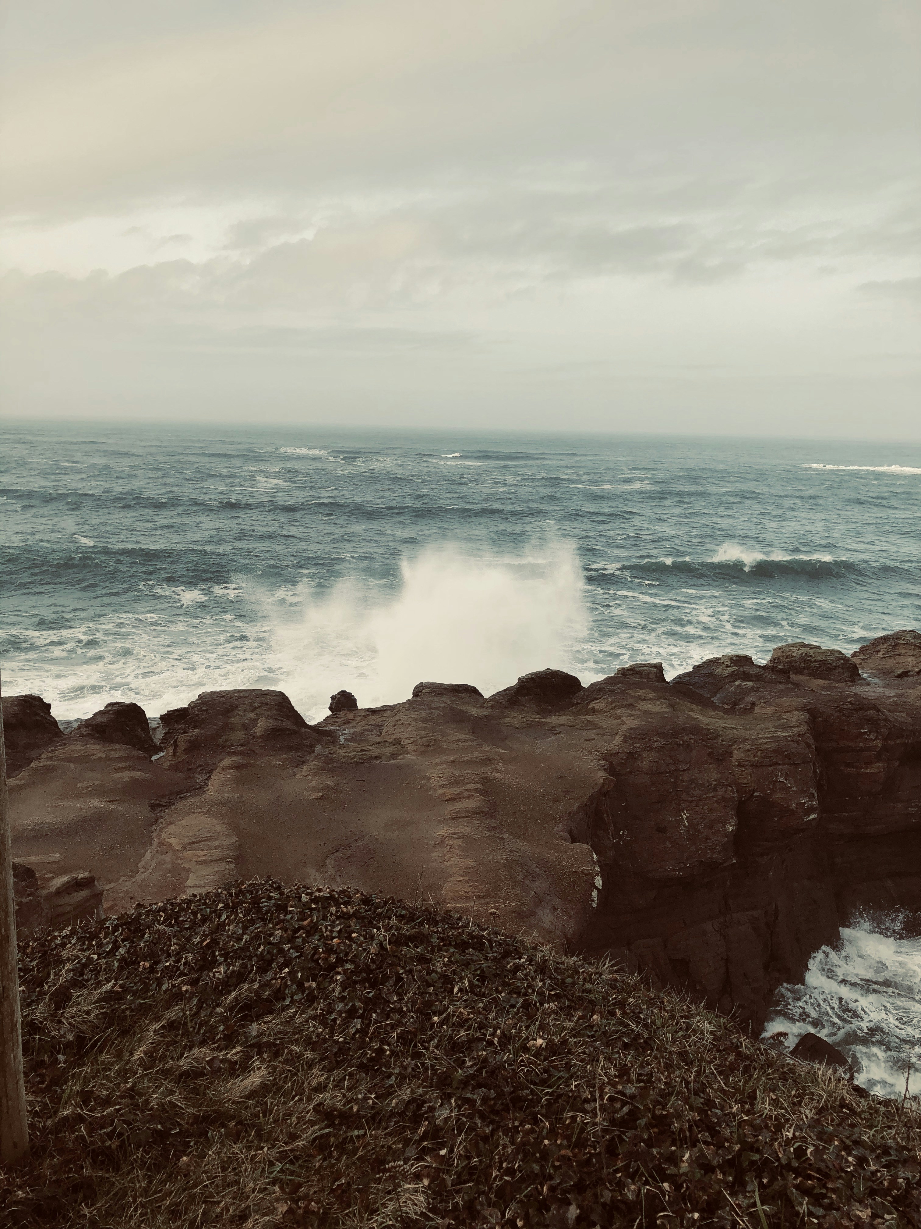 Rogue Wave Clash on a Rugged Basalt Coast at Dusk