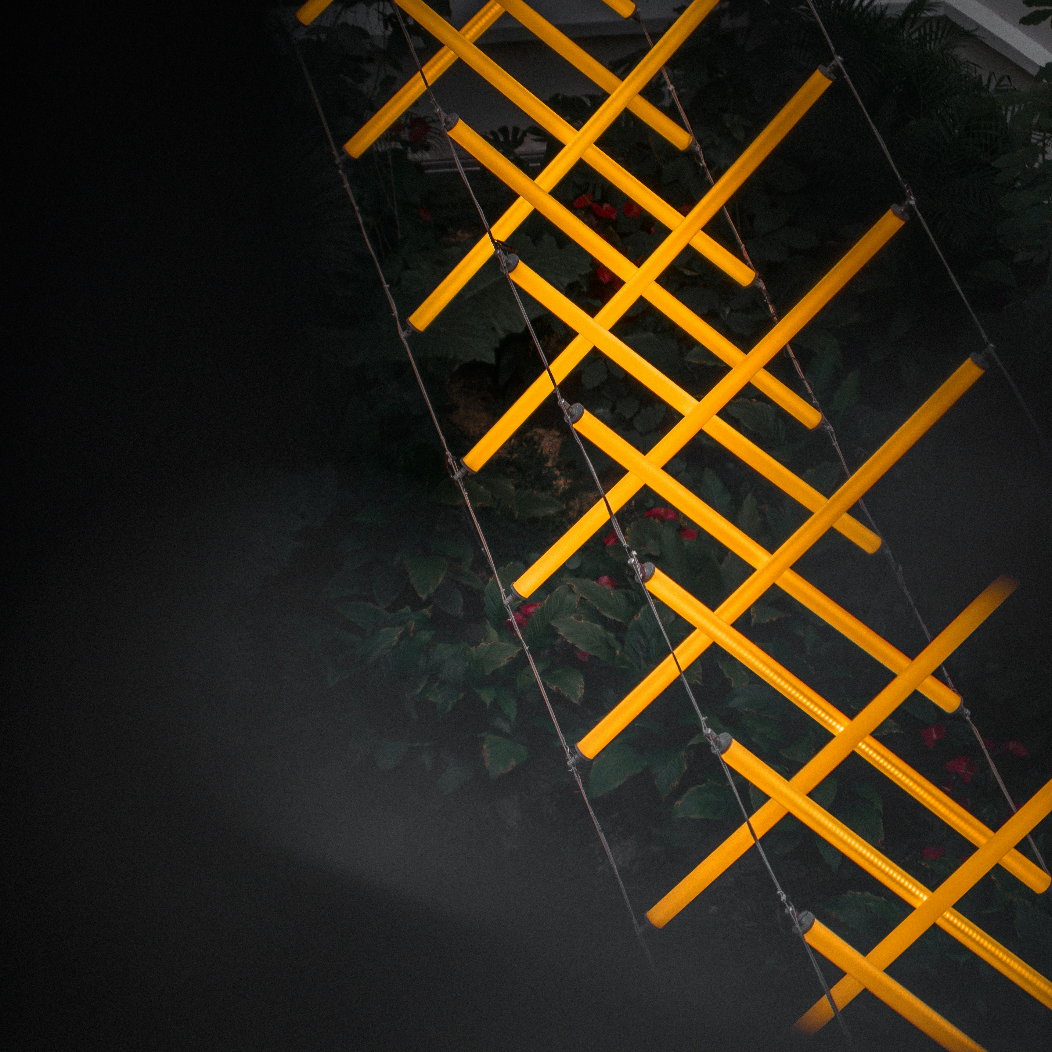 Yellow metal frame on water photo – Free Banister Image on Unsplash