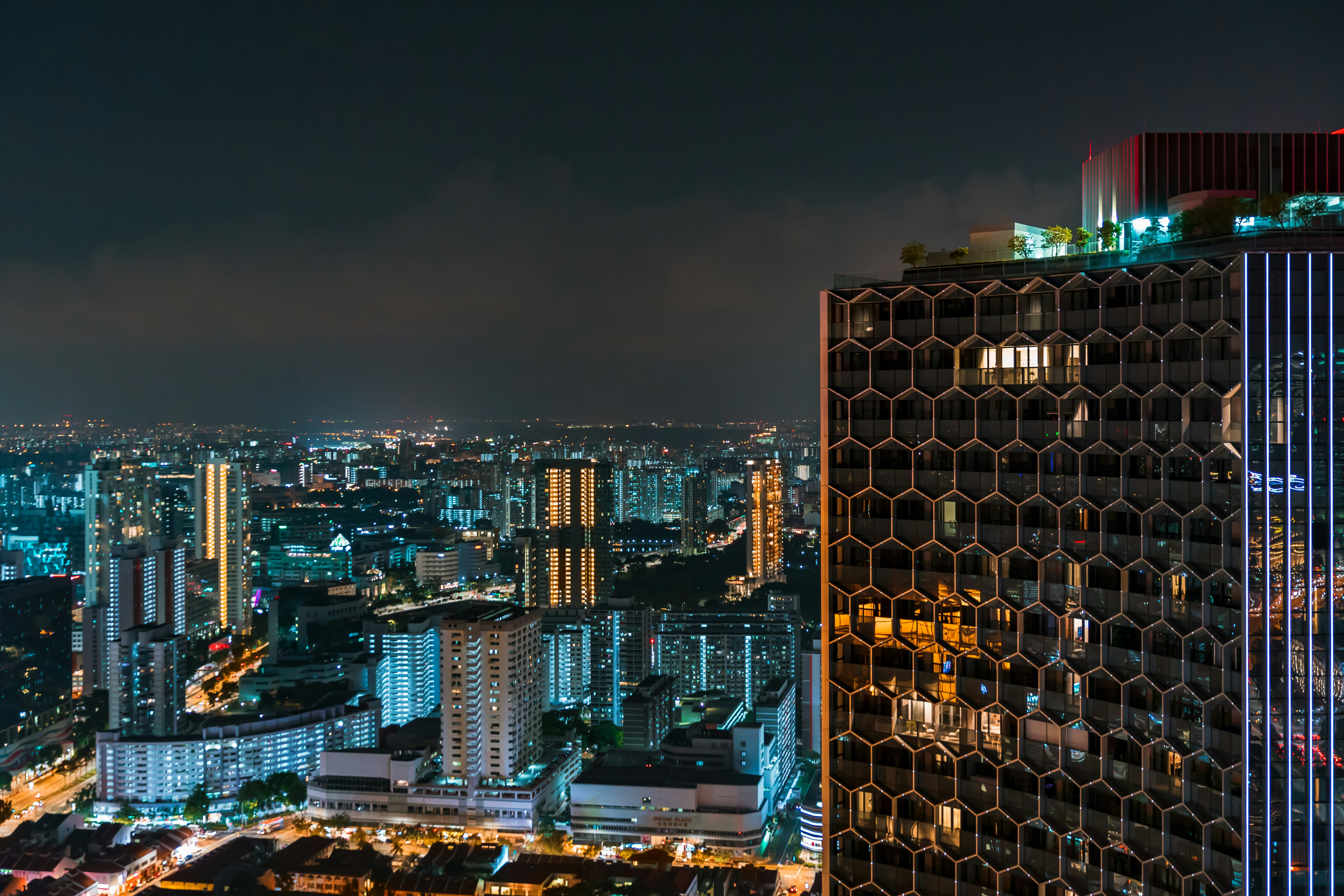 City with high rise buildings during night time photo – Free Building ...