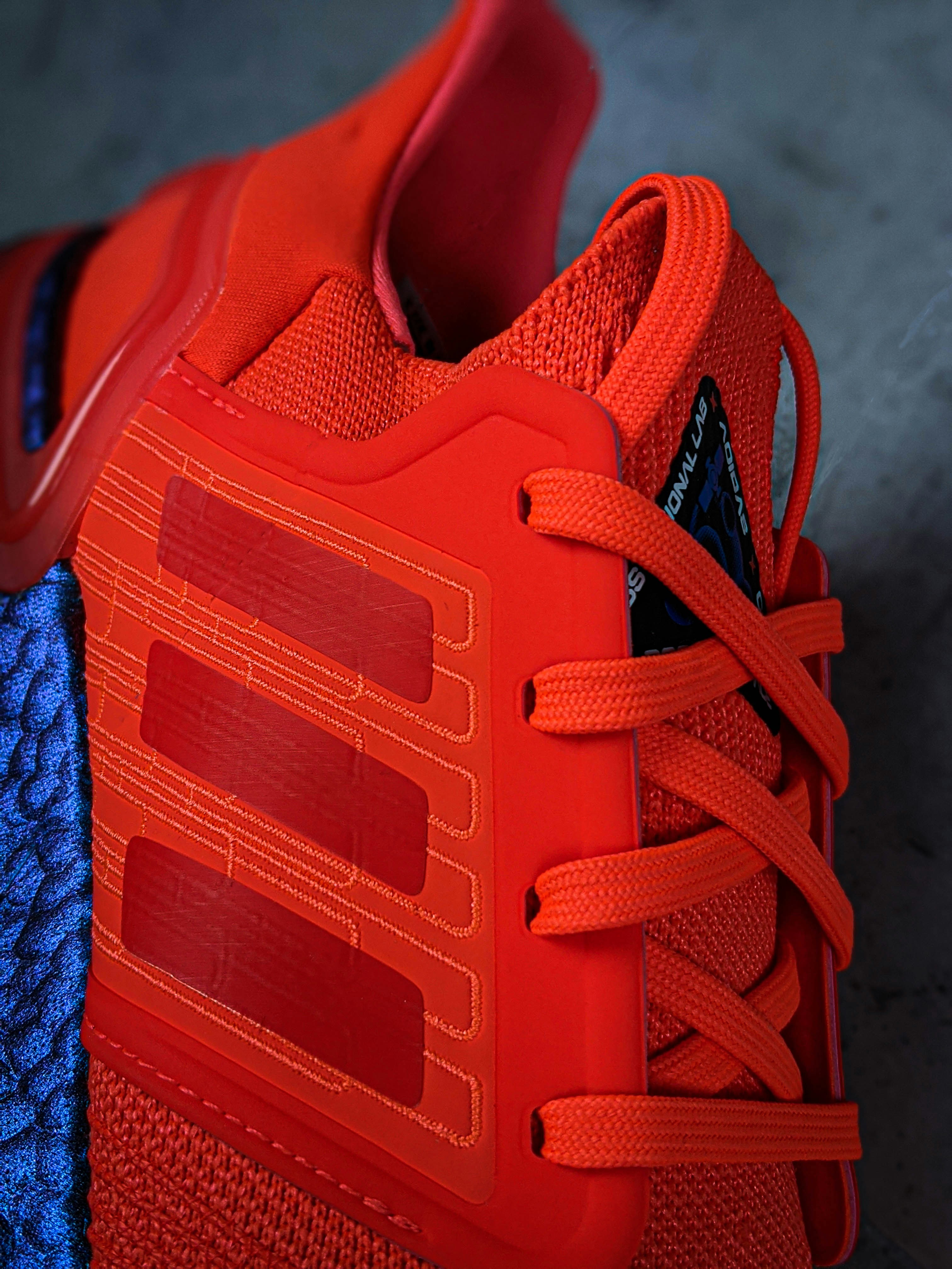 Red and blue nike athletic shoe photo – Free Red Image on Unsplash