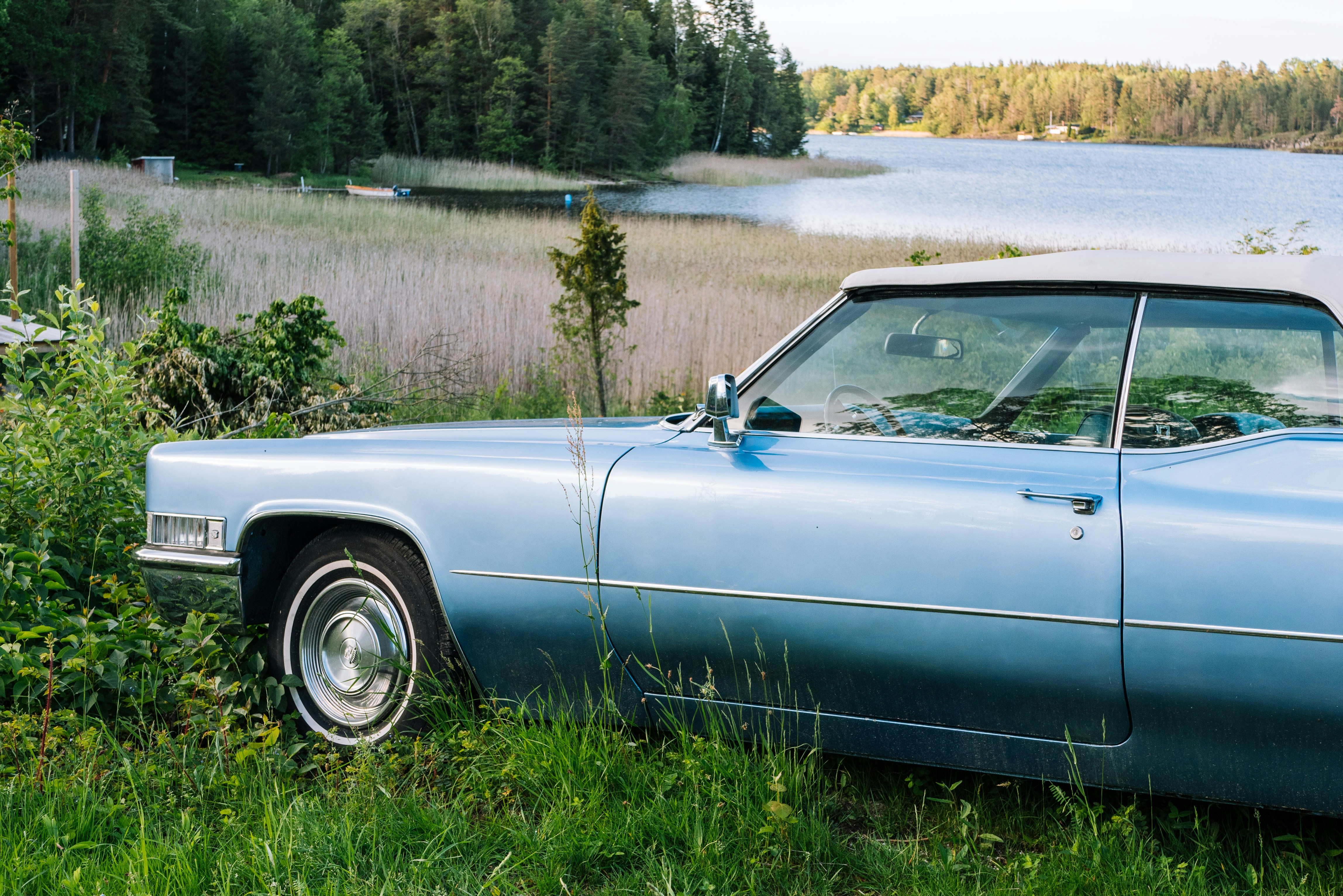 Azure Vintage Cruiser Resting by the Quiet Lakeside