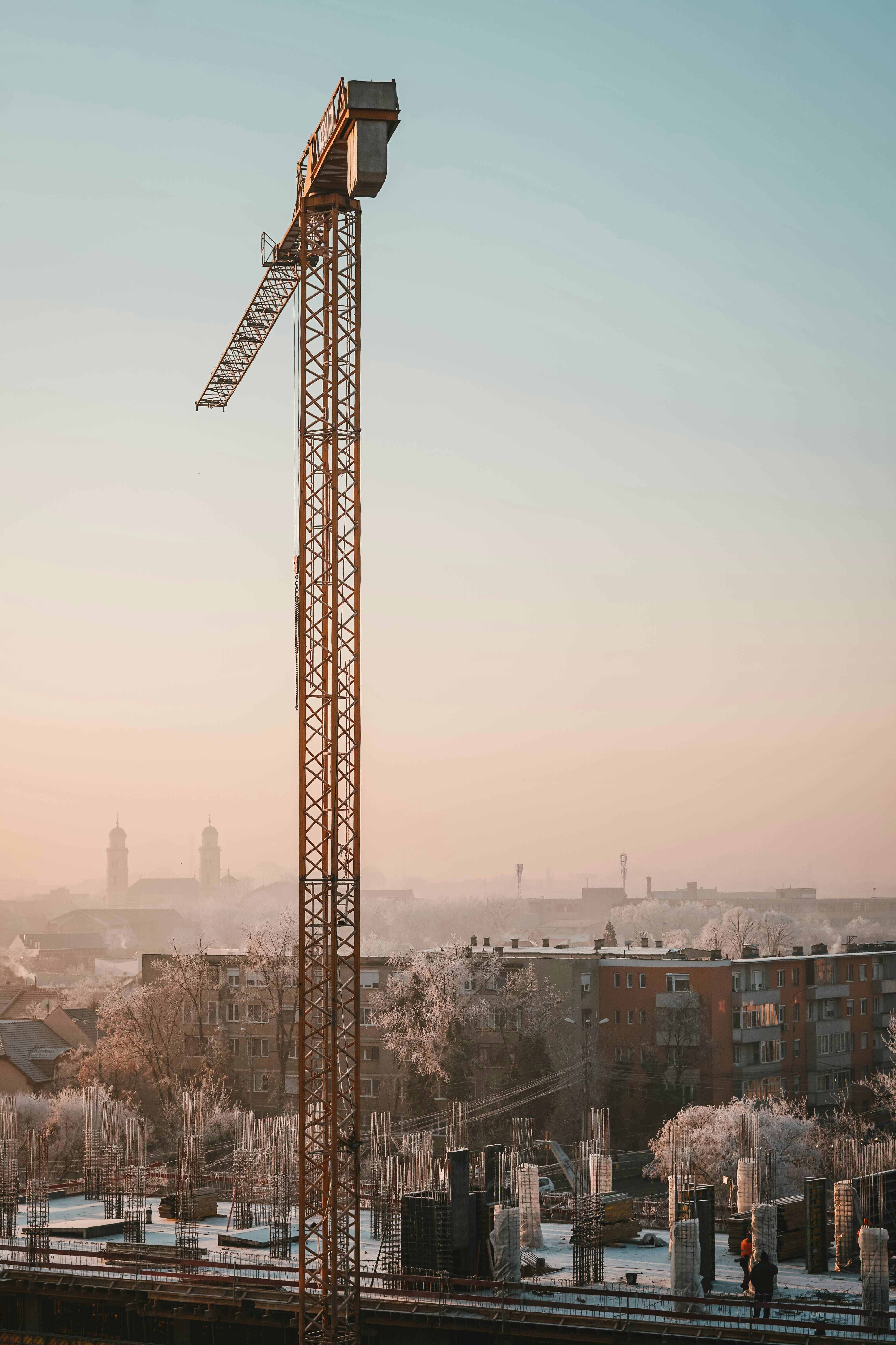Tower Crane Reaching Over a Frosty City