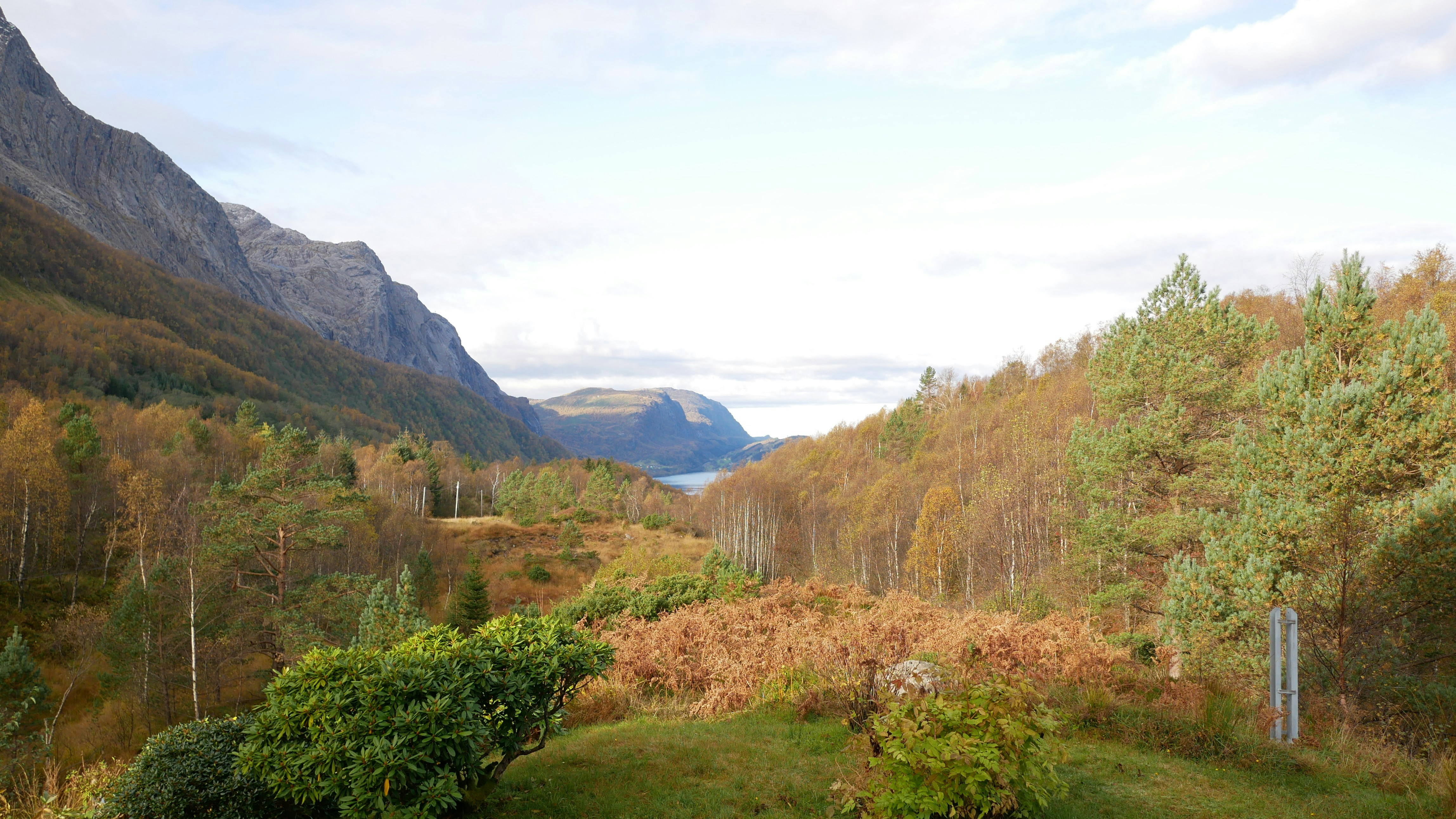 Valley Threshold: Mountains Framing a Golden Canal