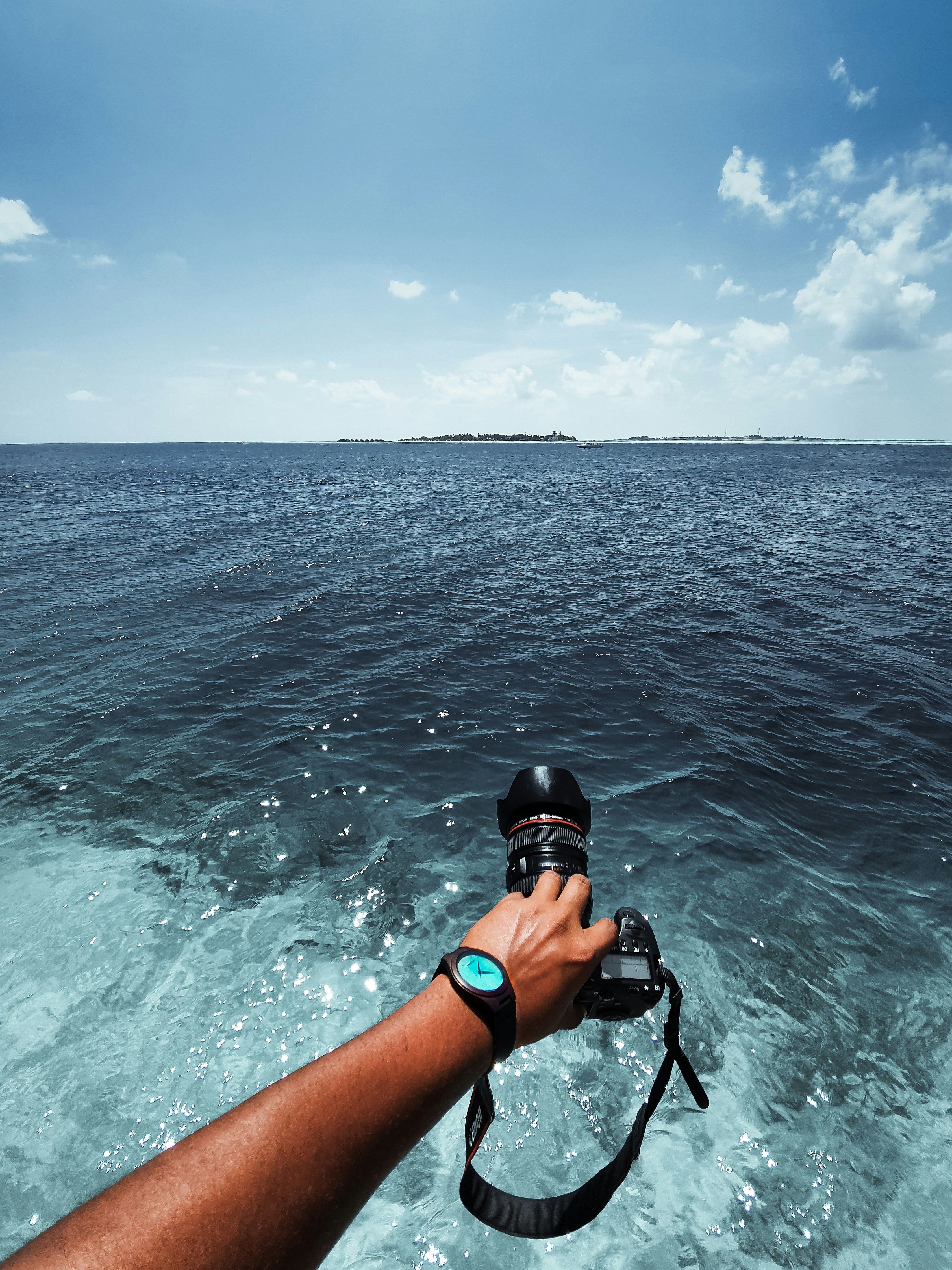 Outstretched Moment: A Surfer’s Gaze Into Turquoise Horizon