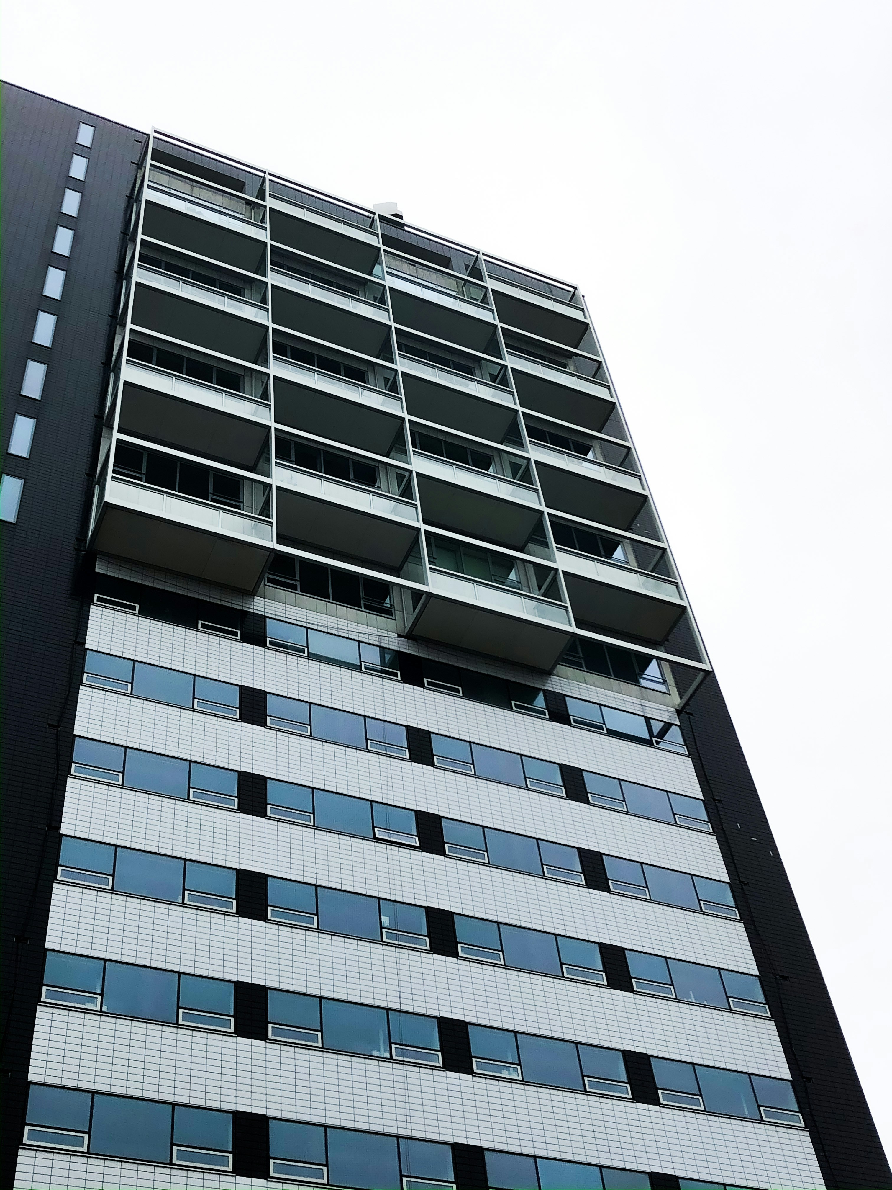 White and black concrete building photo – Free Netherlands Image on ...