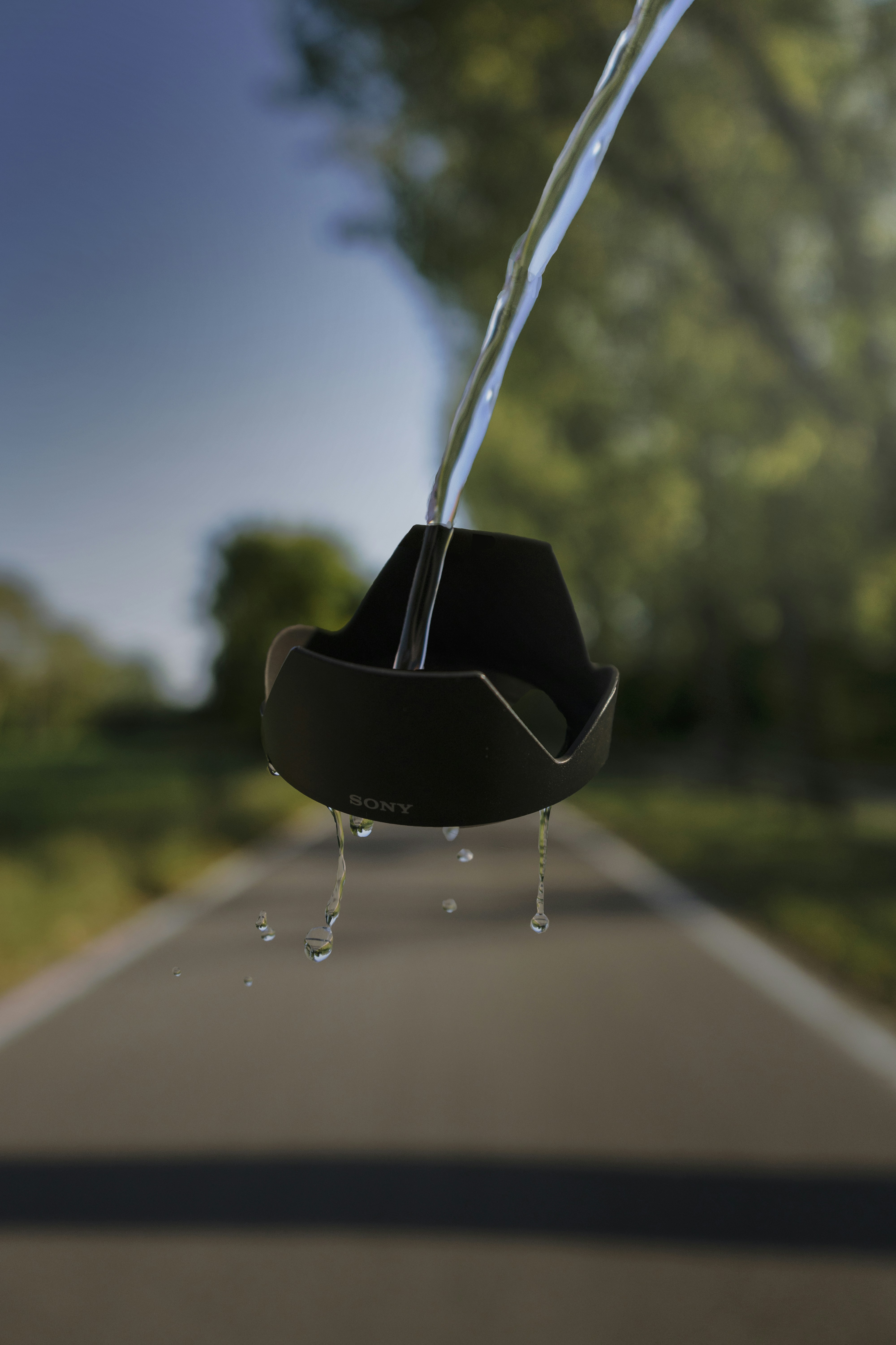 Liquid Glass on a Pedestal: Watering a Quiet Path
