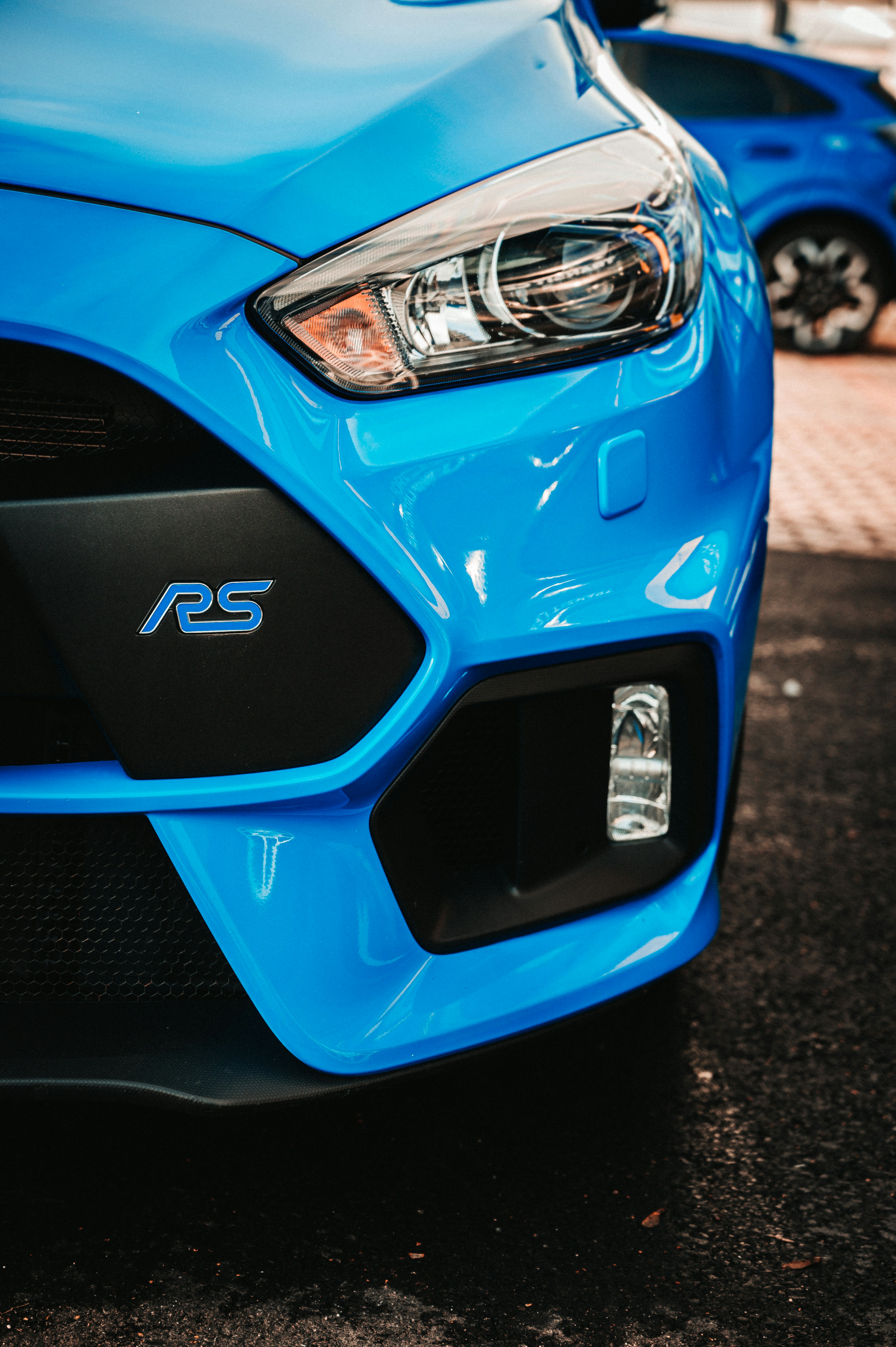Azure RS Front End: Close-Up on Headlight and Badge