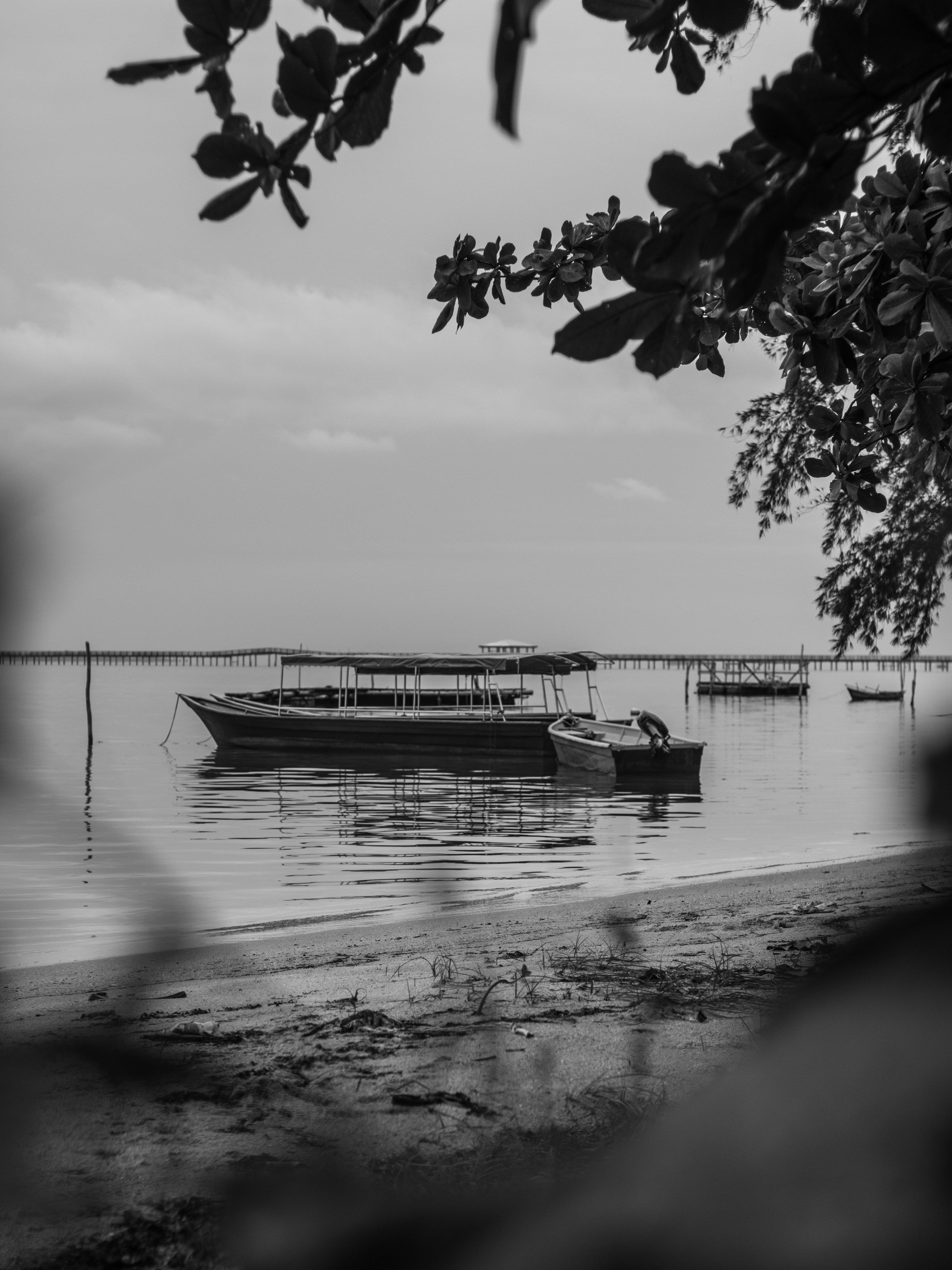 Grayscale photo of boat on water photo – Free Grey Image on Unsplash