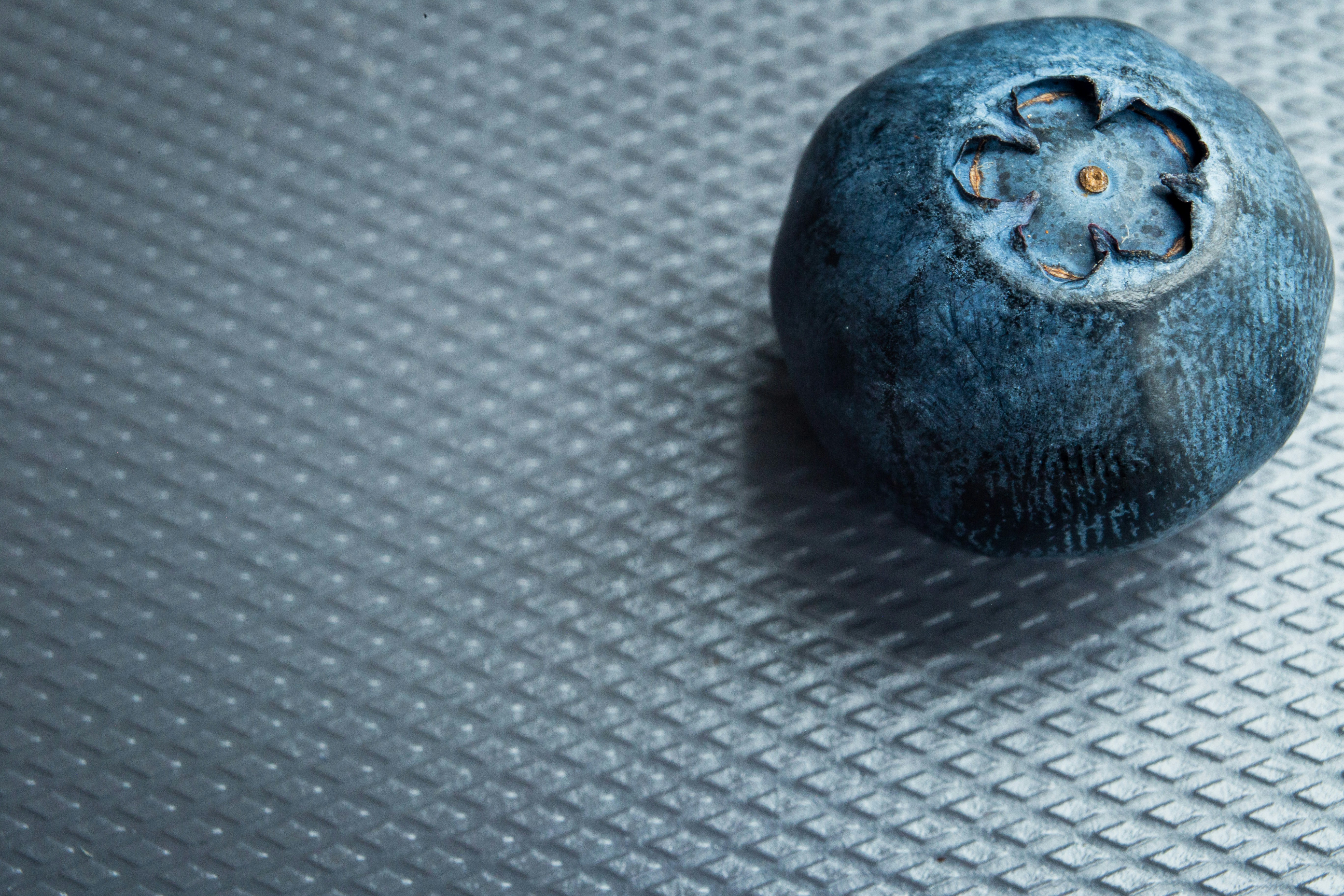 Azure Berry on a Diamond-Plate Canvas