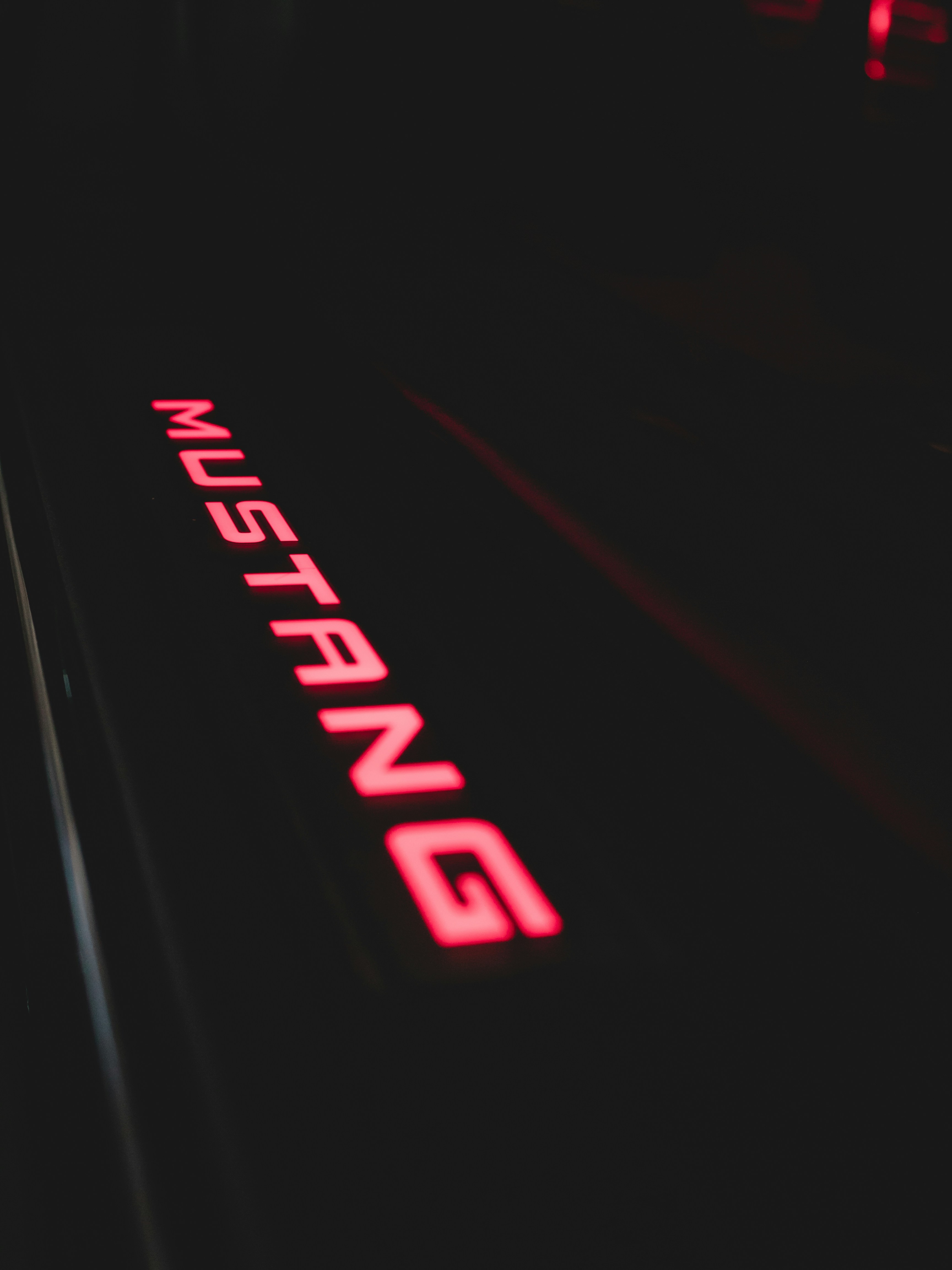 Black and red UNK neon light photo – Free American car Image on Unsplash