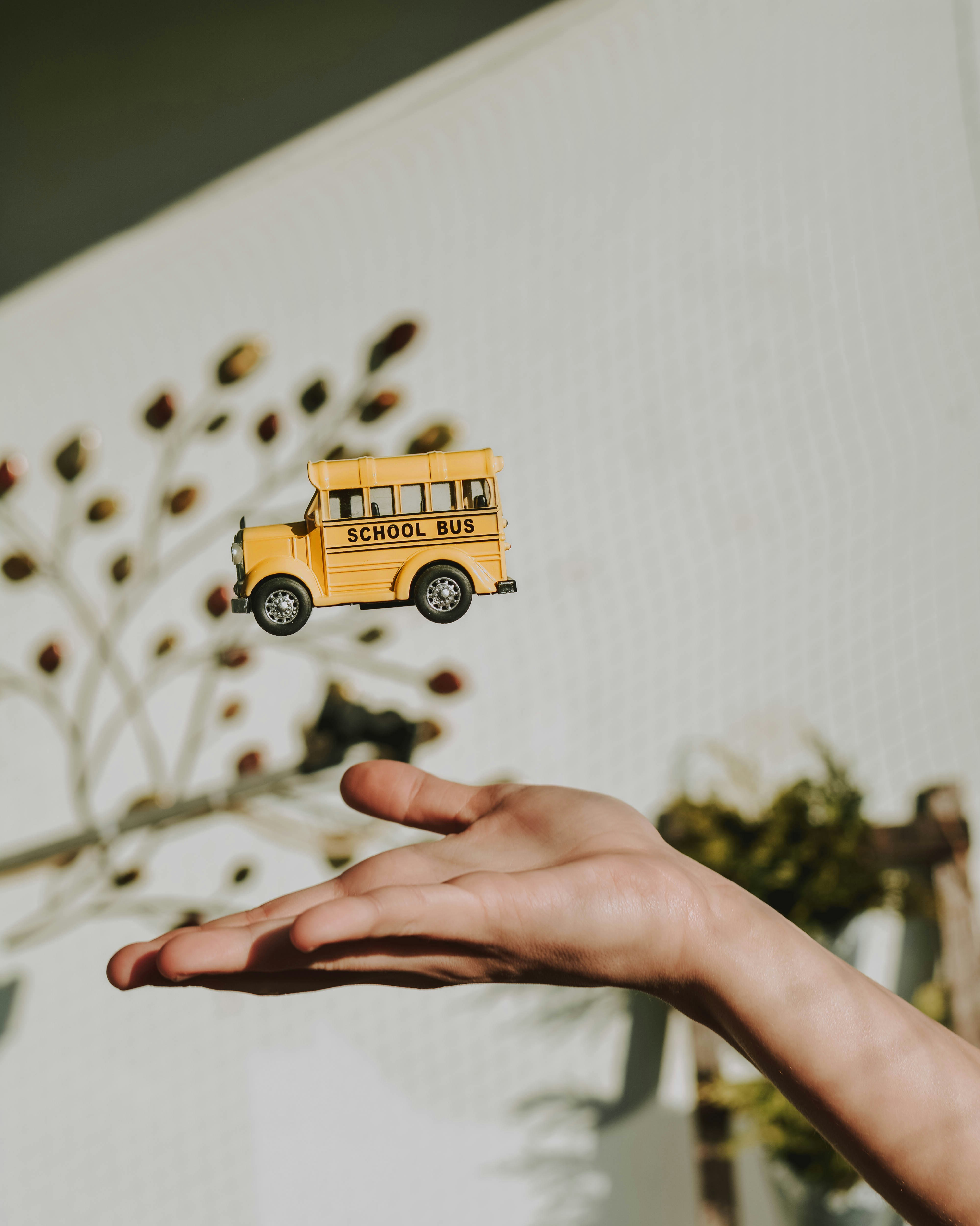 Miniature School Bus in Mid-Air