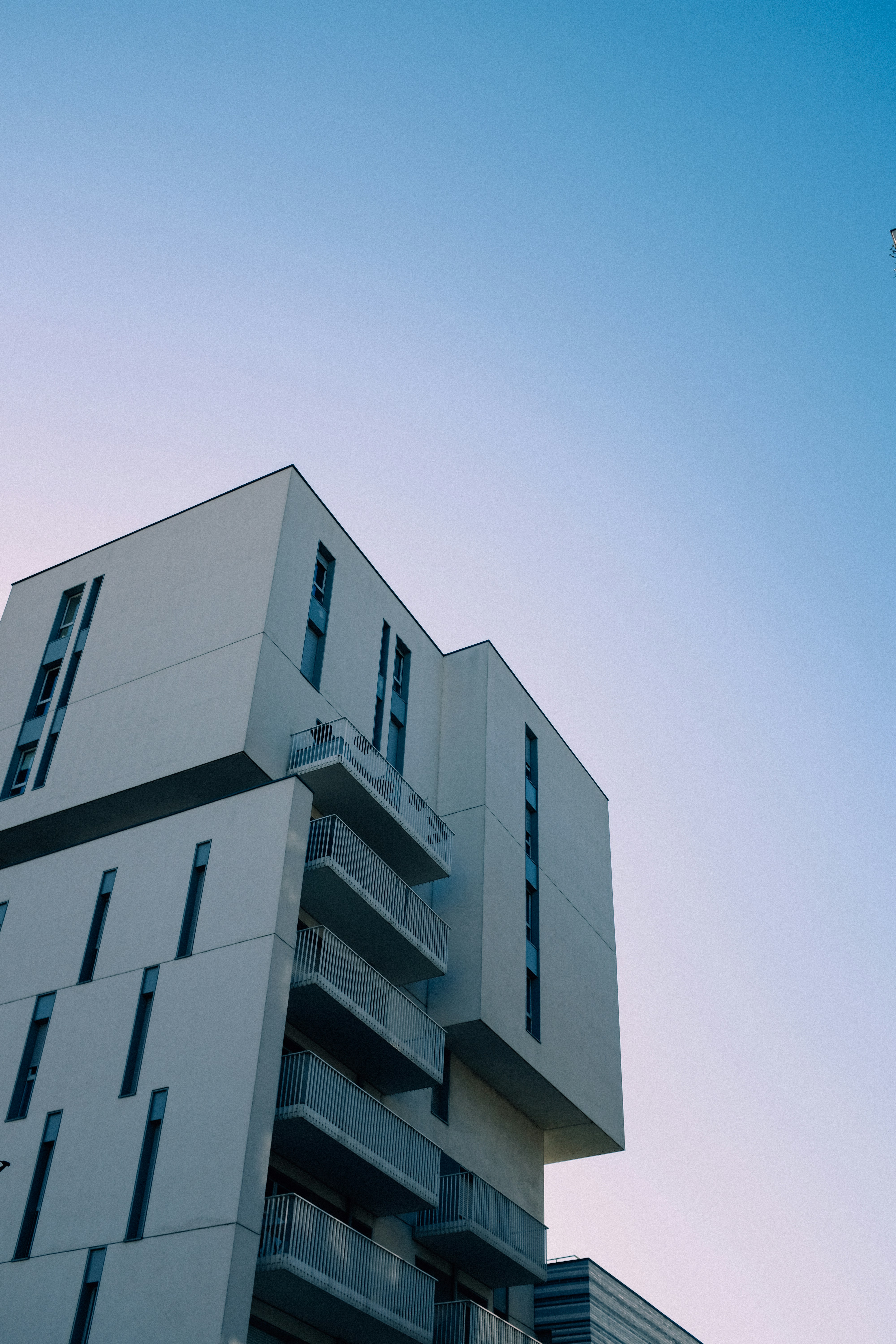 Gray concrete building under blue sky during daytime photo – Free ...