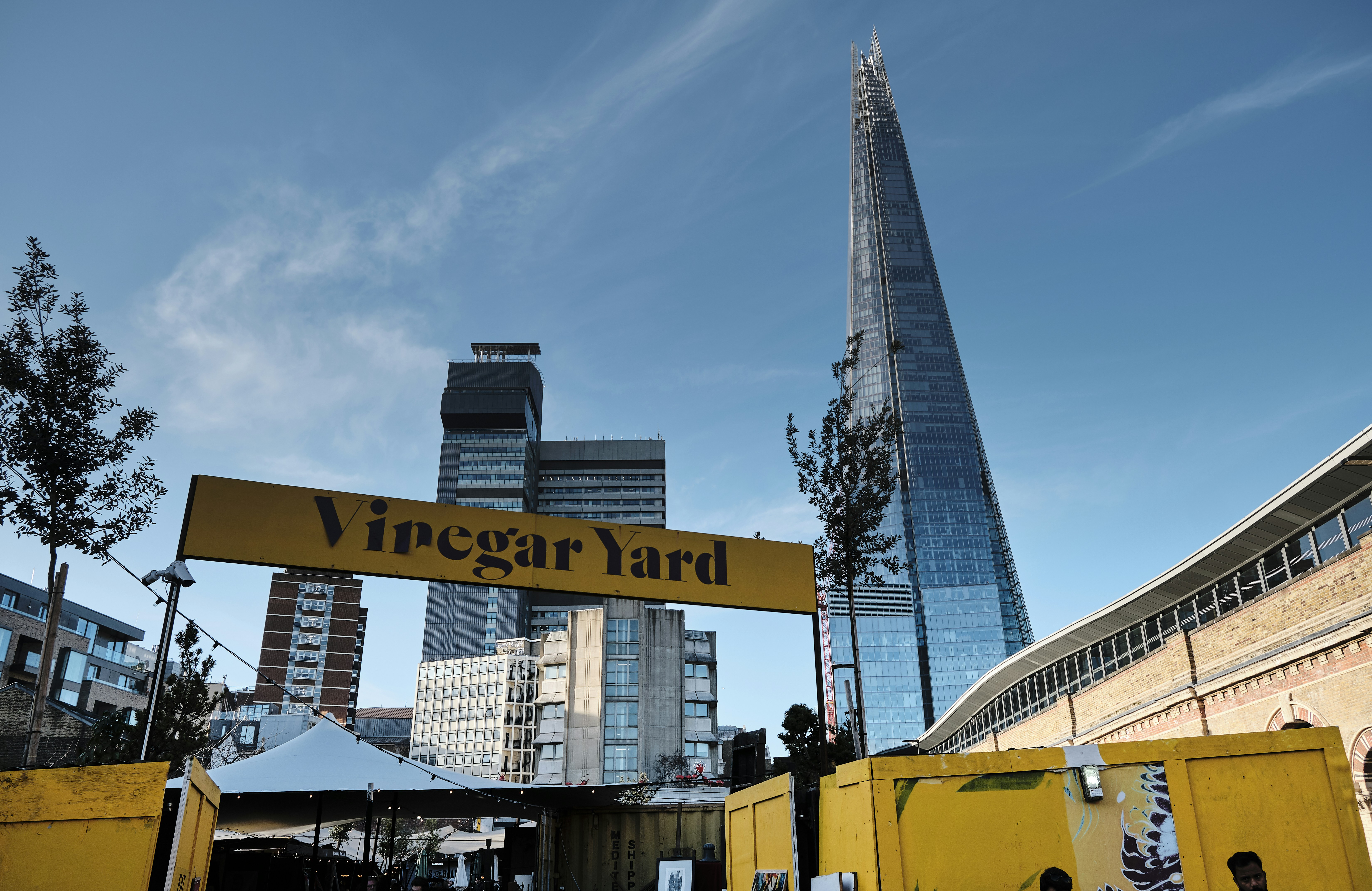 Glass Needle Over Vinegar Yard: A Cityscape in Blue