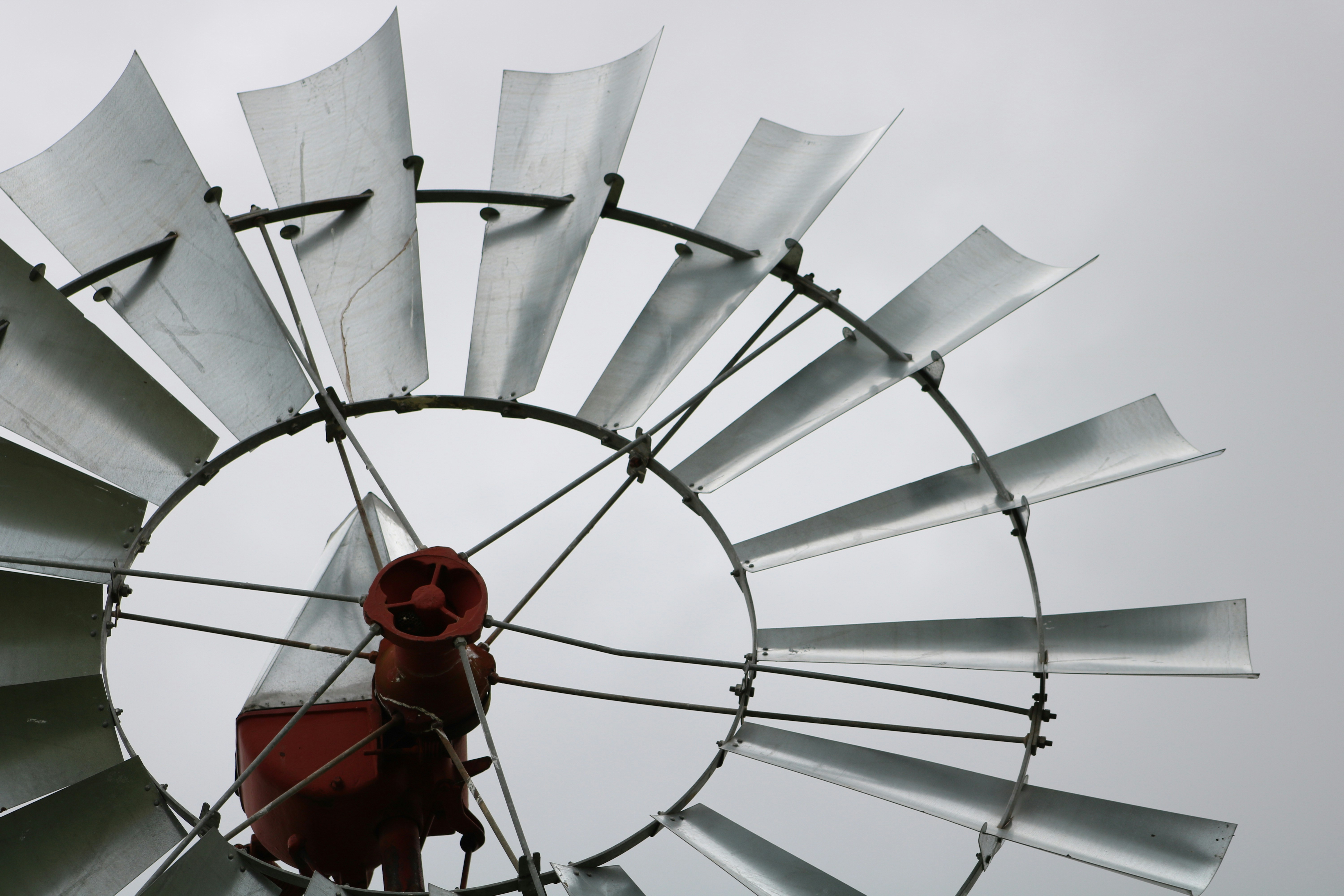 Red Core of a Metal Wind Wheel: A Close-Up on the Circular Rotor