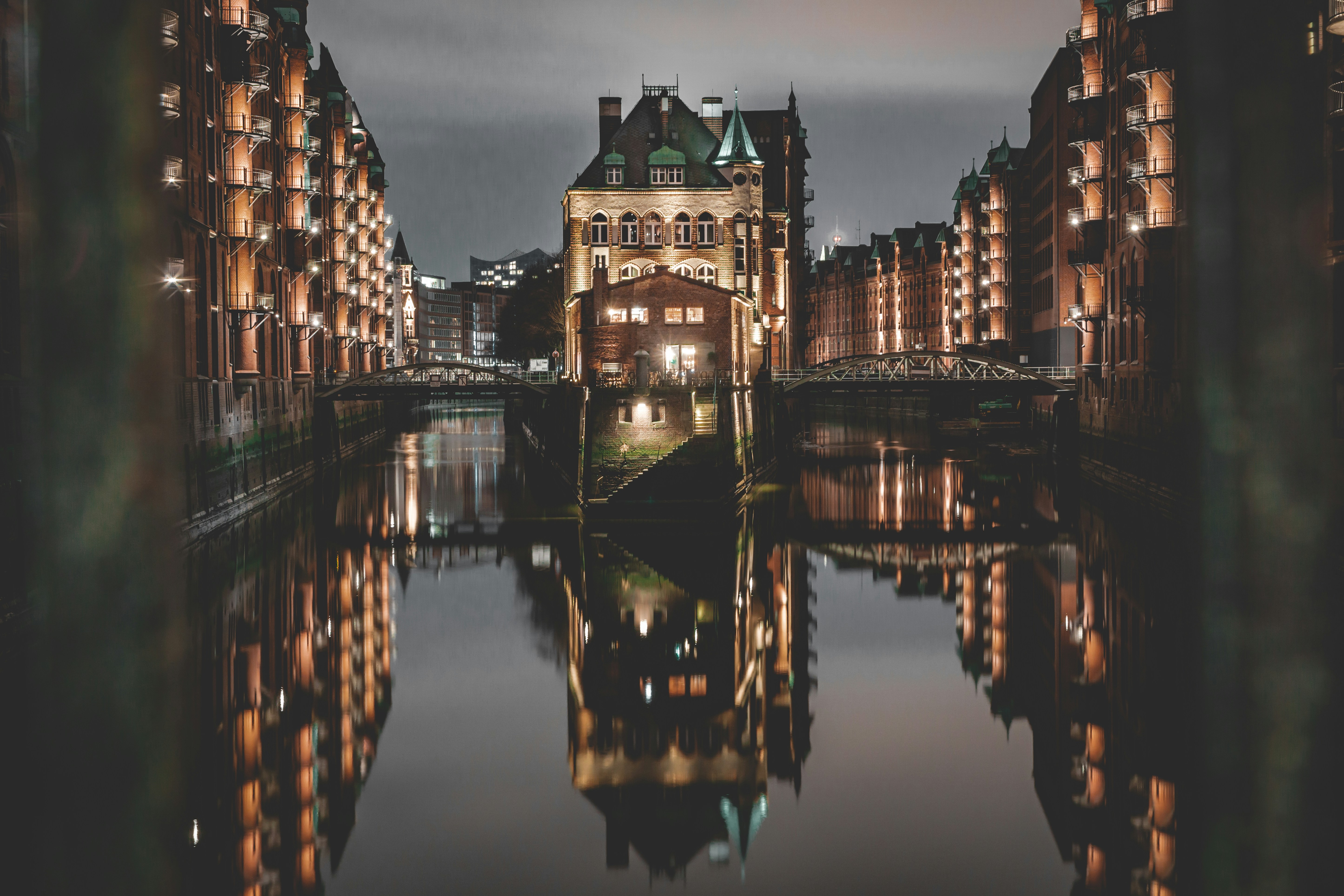 Central Beacon over a Silent Canal: Nighttime Symmetry