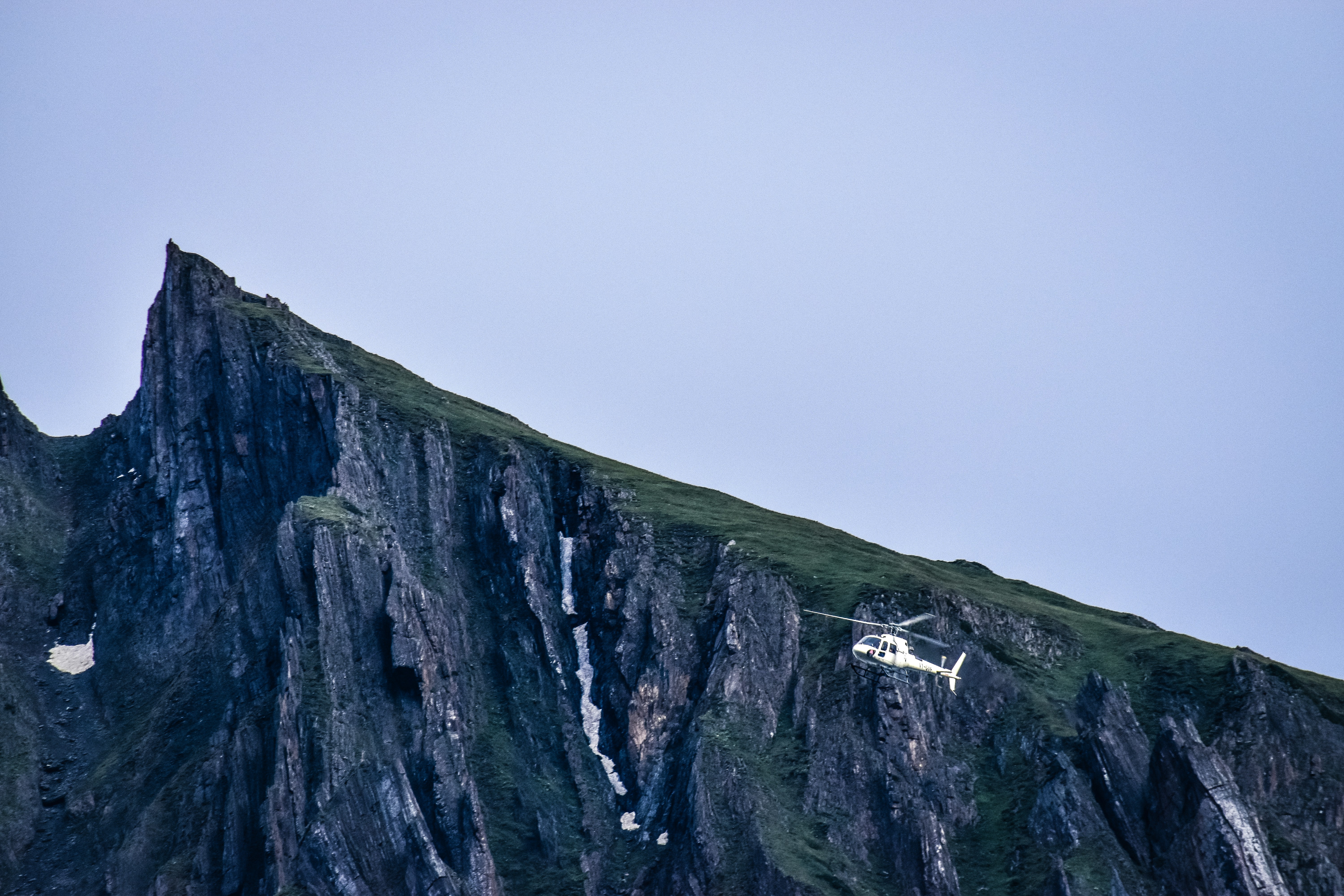 Helicopter Perched on a Rocky Summit