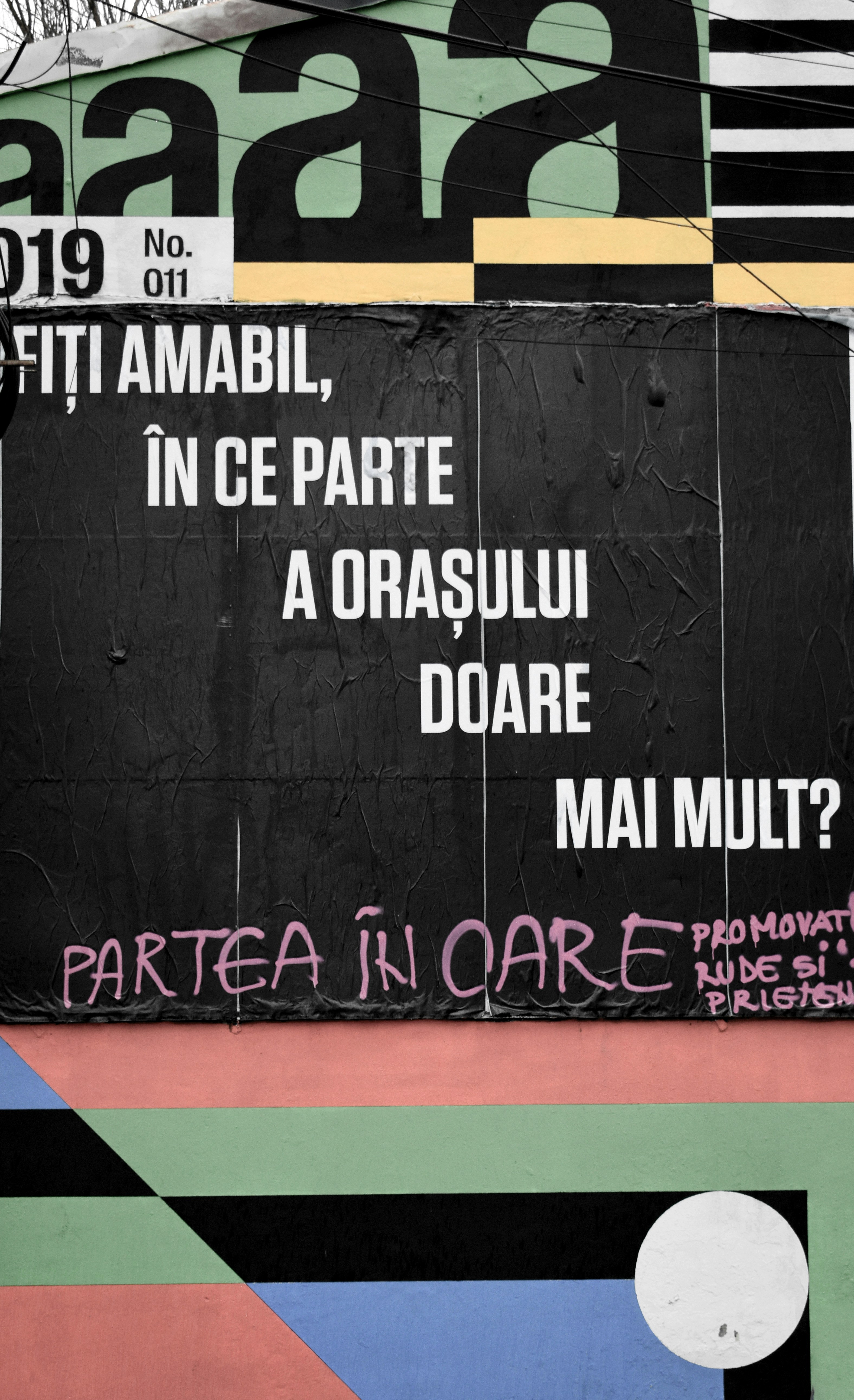 Whispers on a Black Banner: Romanian Street Poster with Colorful Geometry