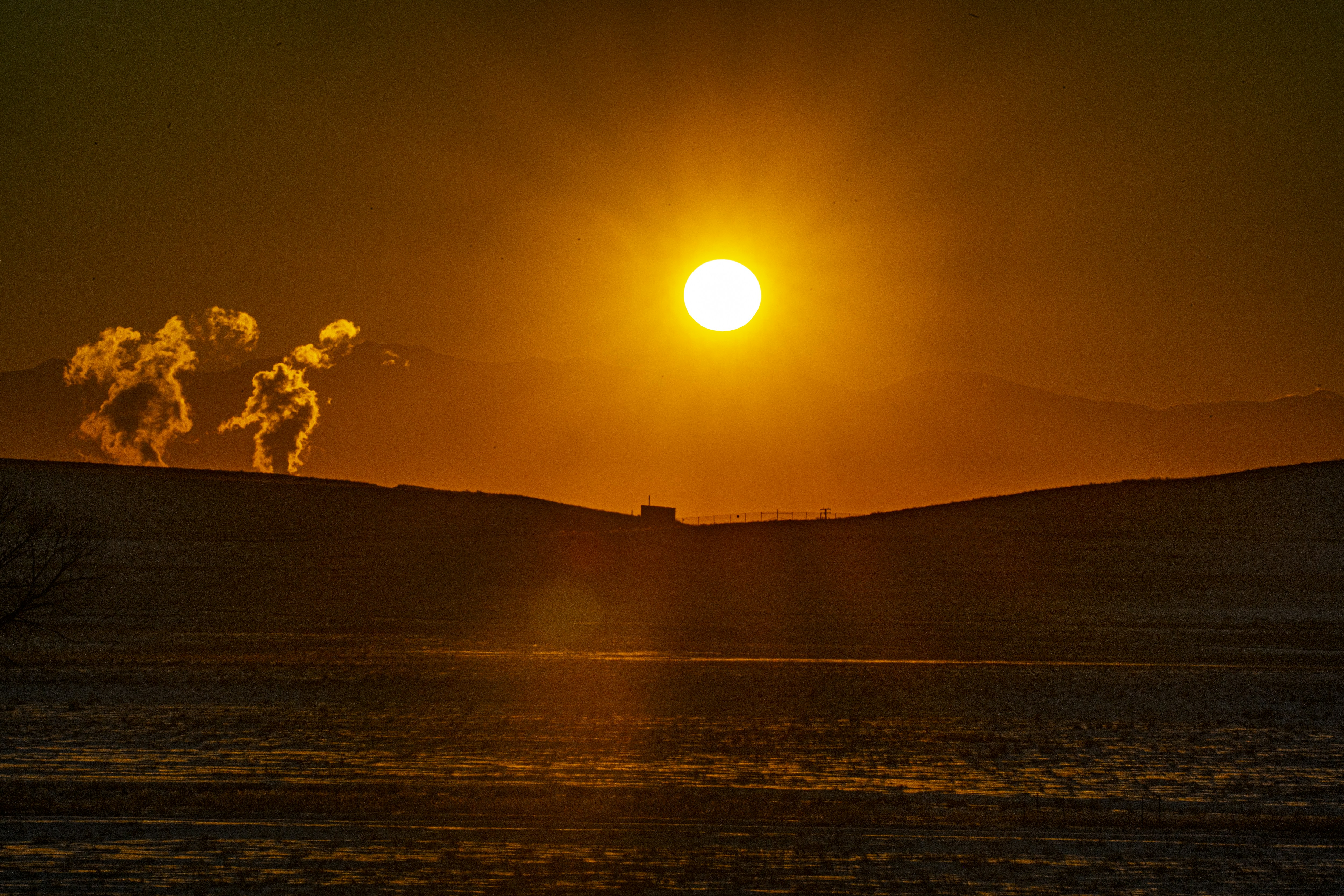 Solar Glaze over Quiet Salt Flats at Dusk