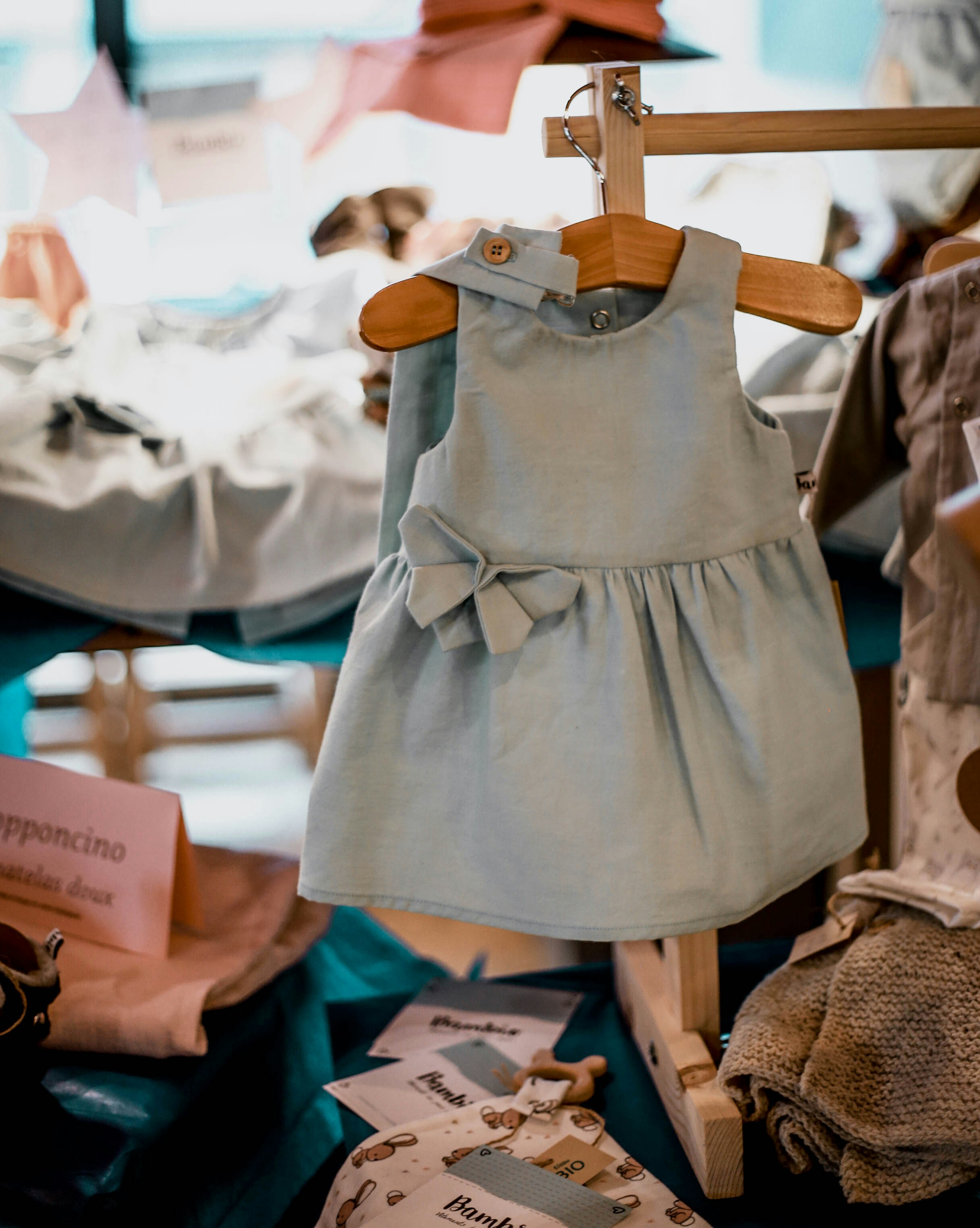Blue and brown dress on brown wooden clothes hanger photo – Free Human ...
