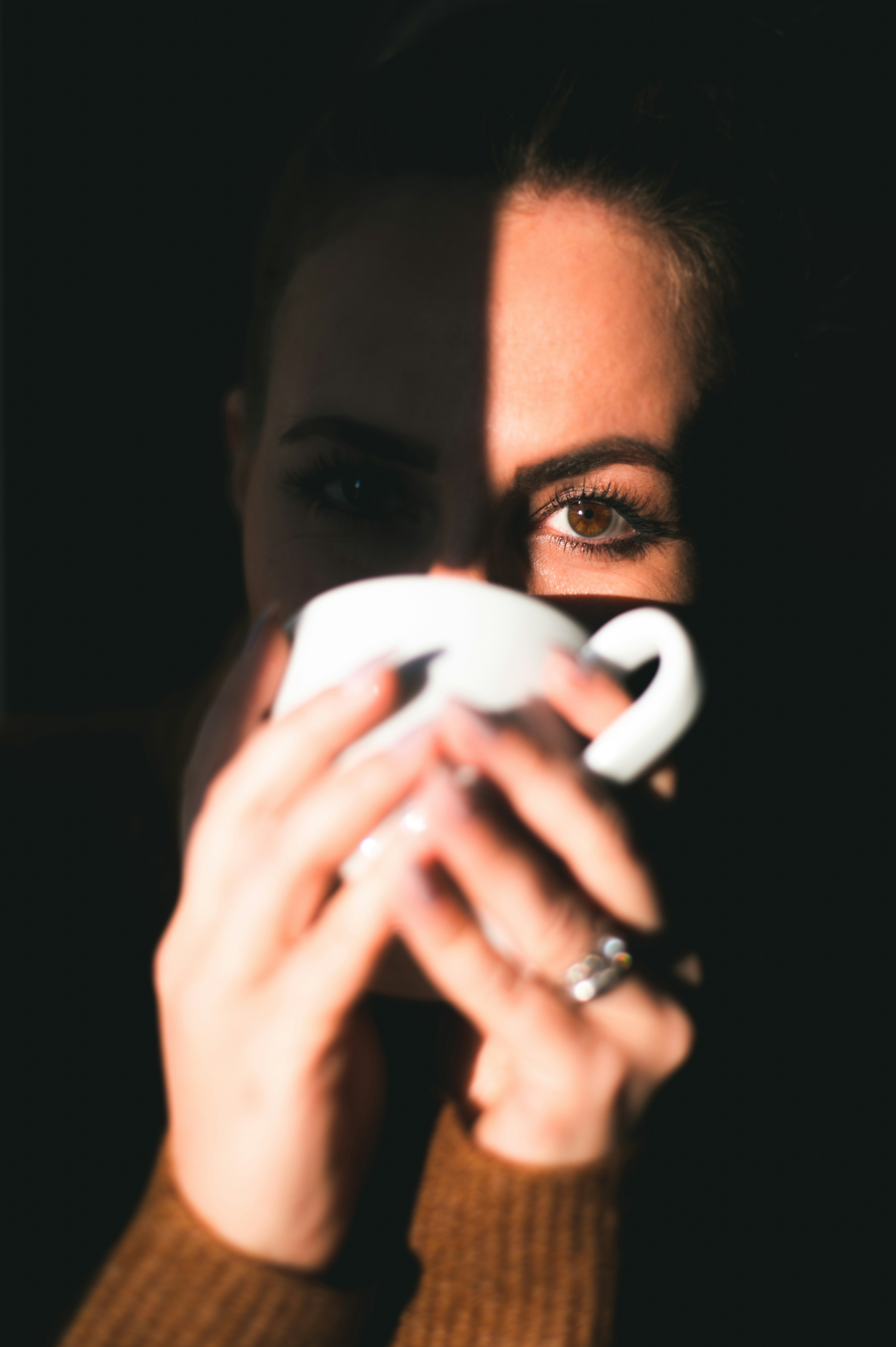 Steam in a Quiet Moment: A Face Half-hidden by a Cup