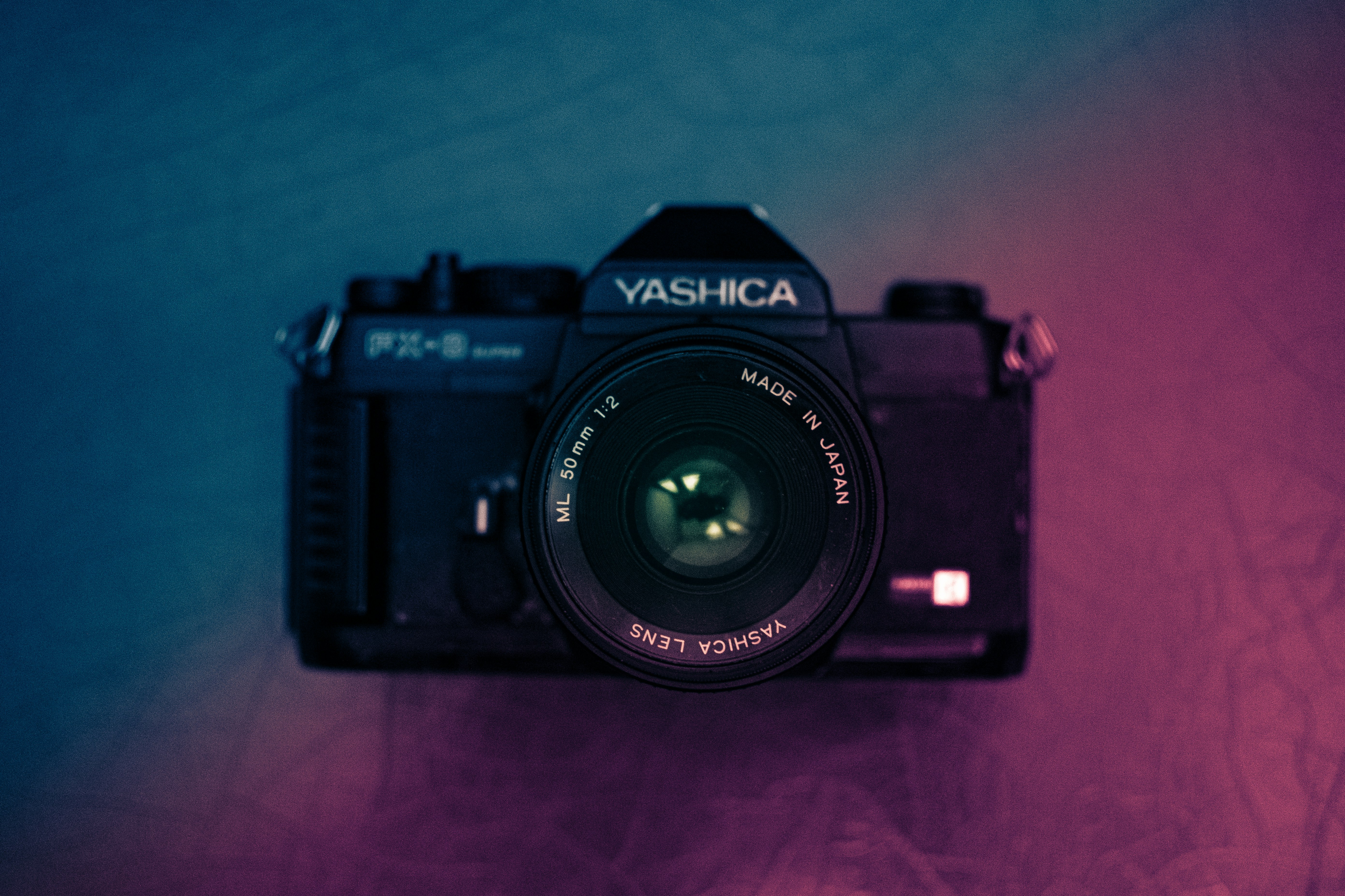 Top-down view of a vintage Yashica camera showcasing its intricate design and lens details.