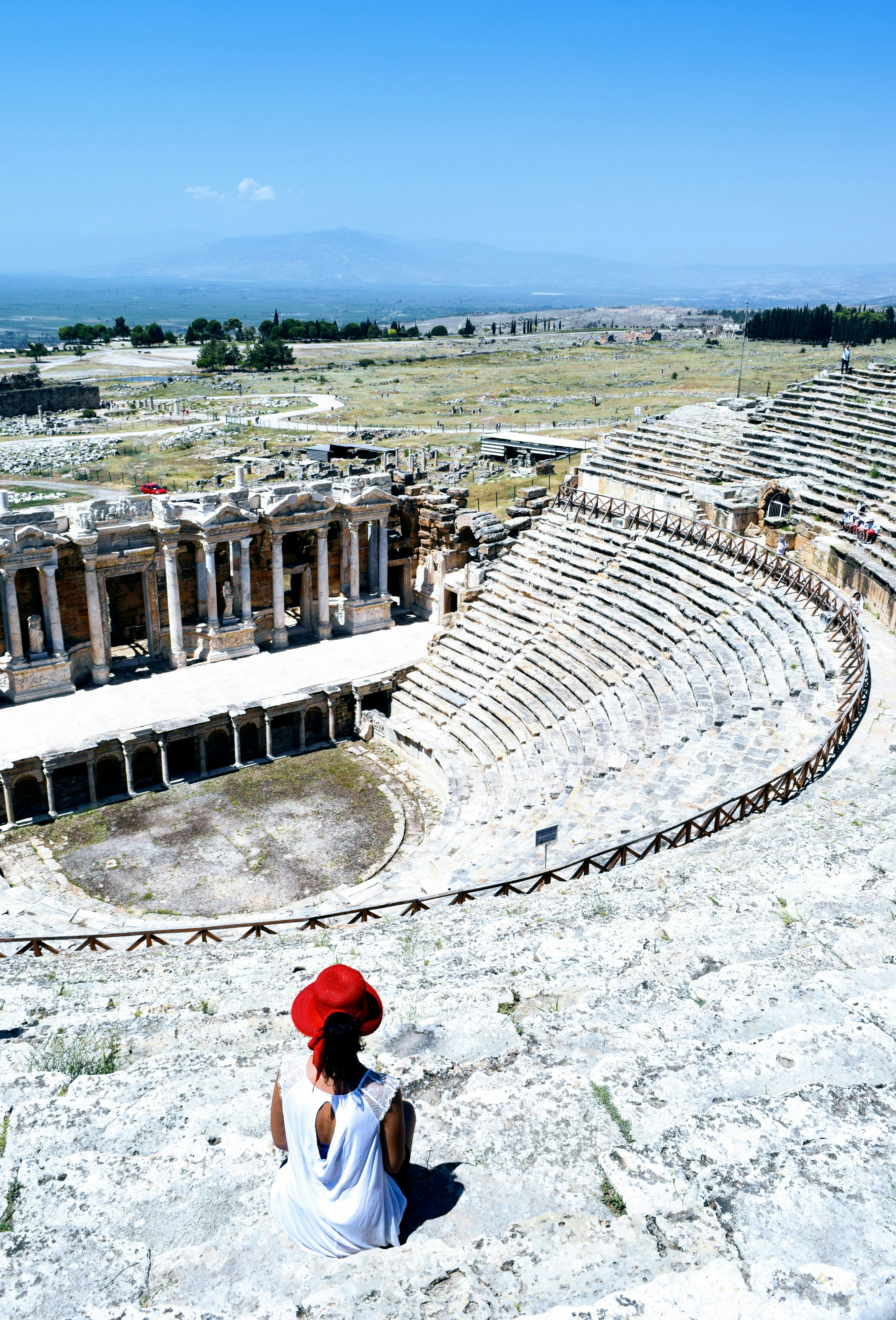 Red Hat and Stone Circles: A Quiet Pause in an Ancient Arena