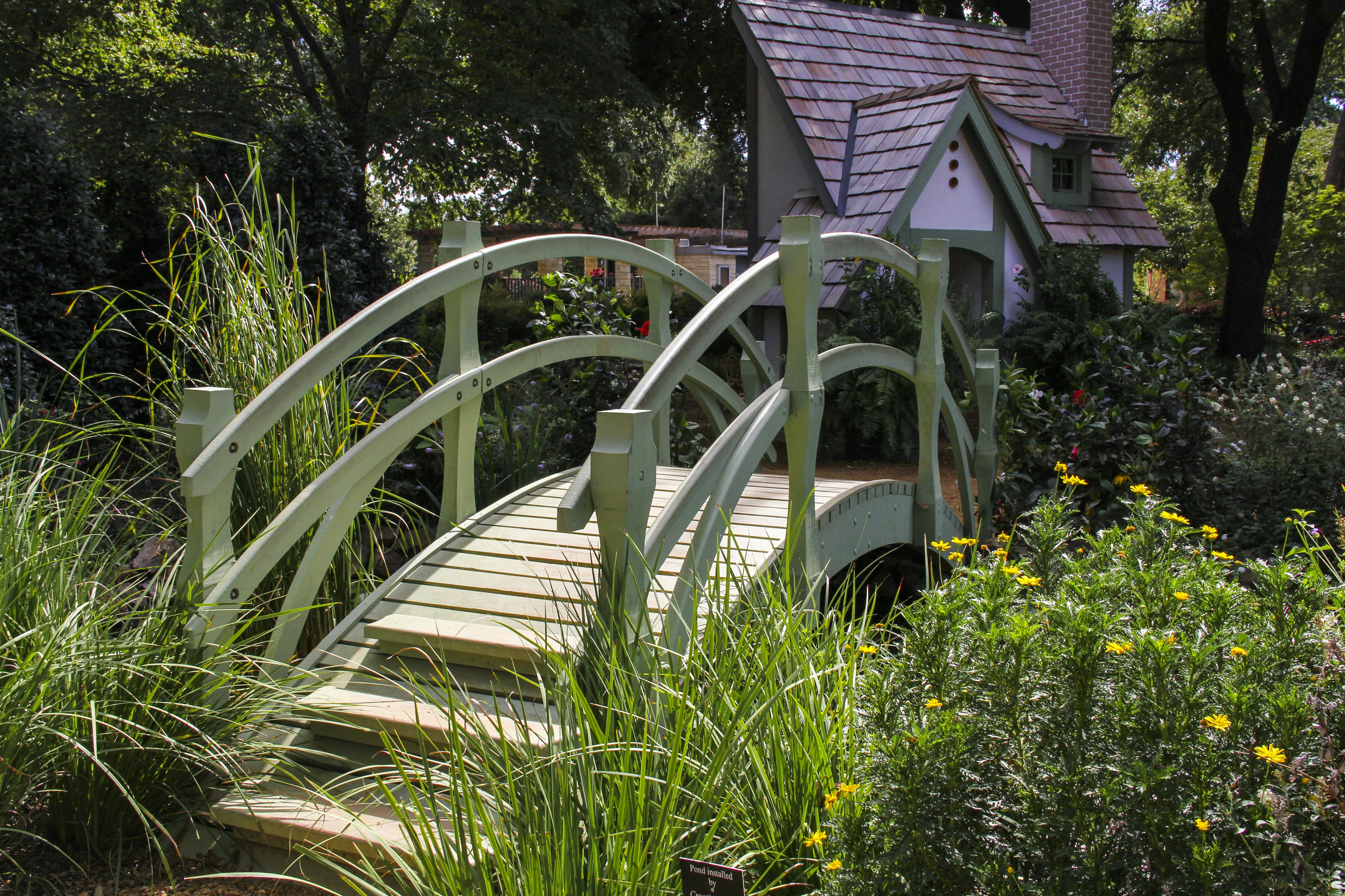 White wooden bridge over green plants photo – Free The dallas arboretum ...