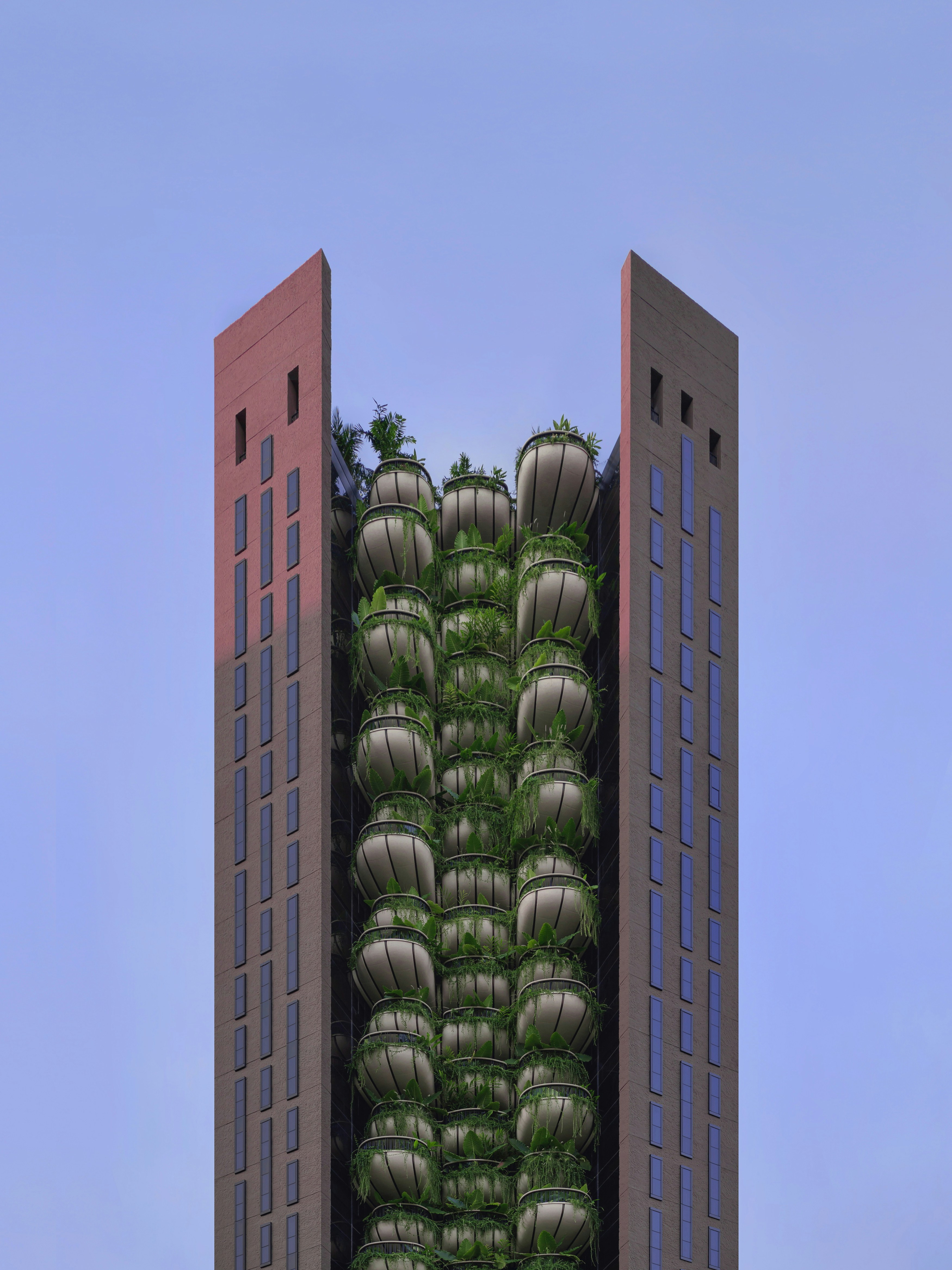 Innovative skyscraper design featuring green terraces and futuristic balconies integrated with lush vegetation.
