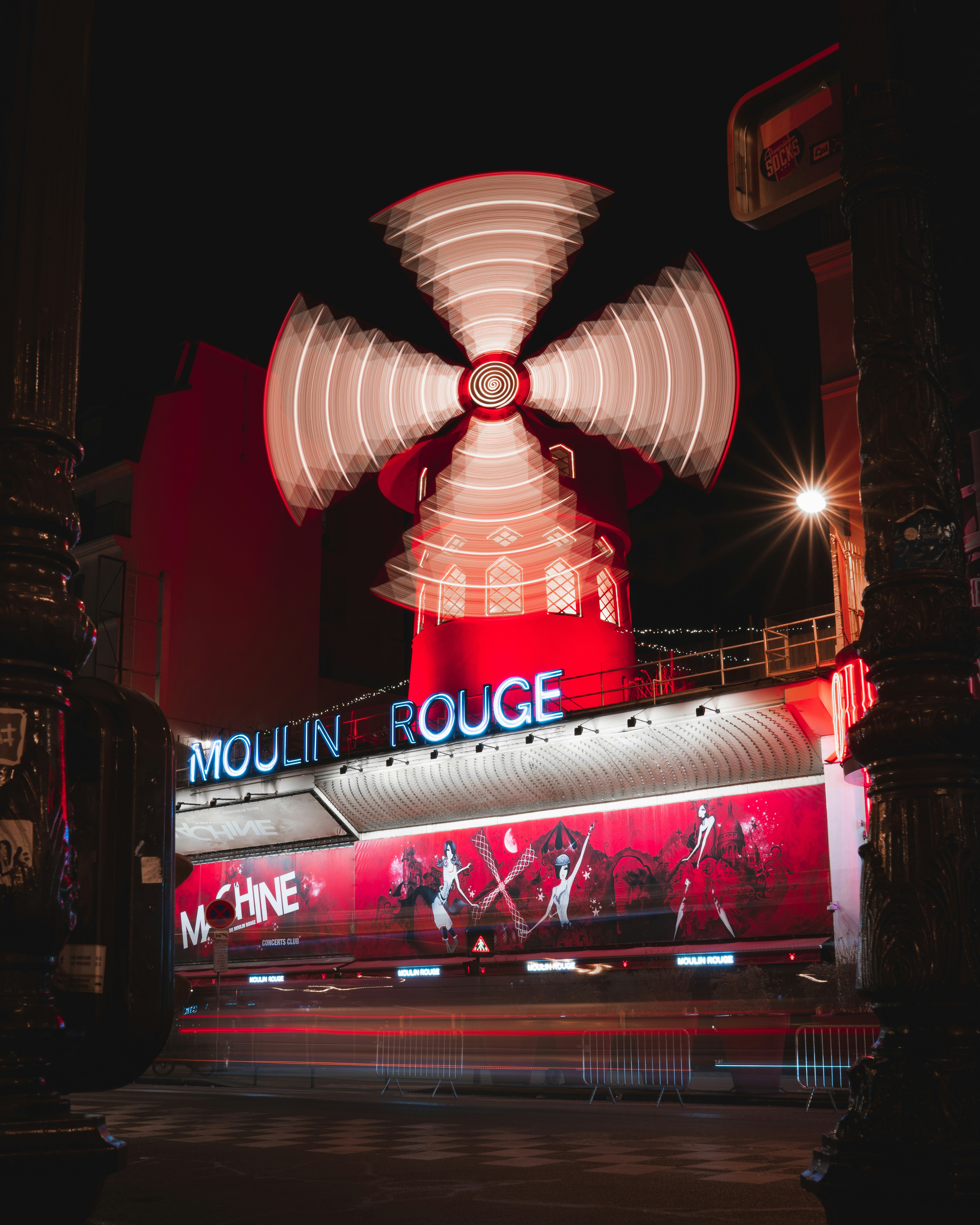 Neon Propeller Night: Moulin Rouge in Motion