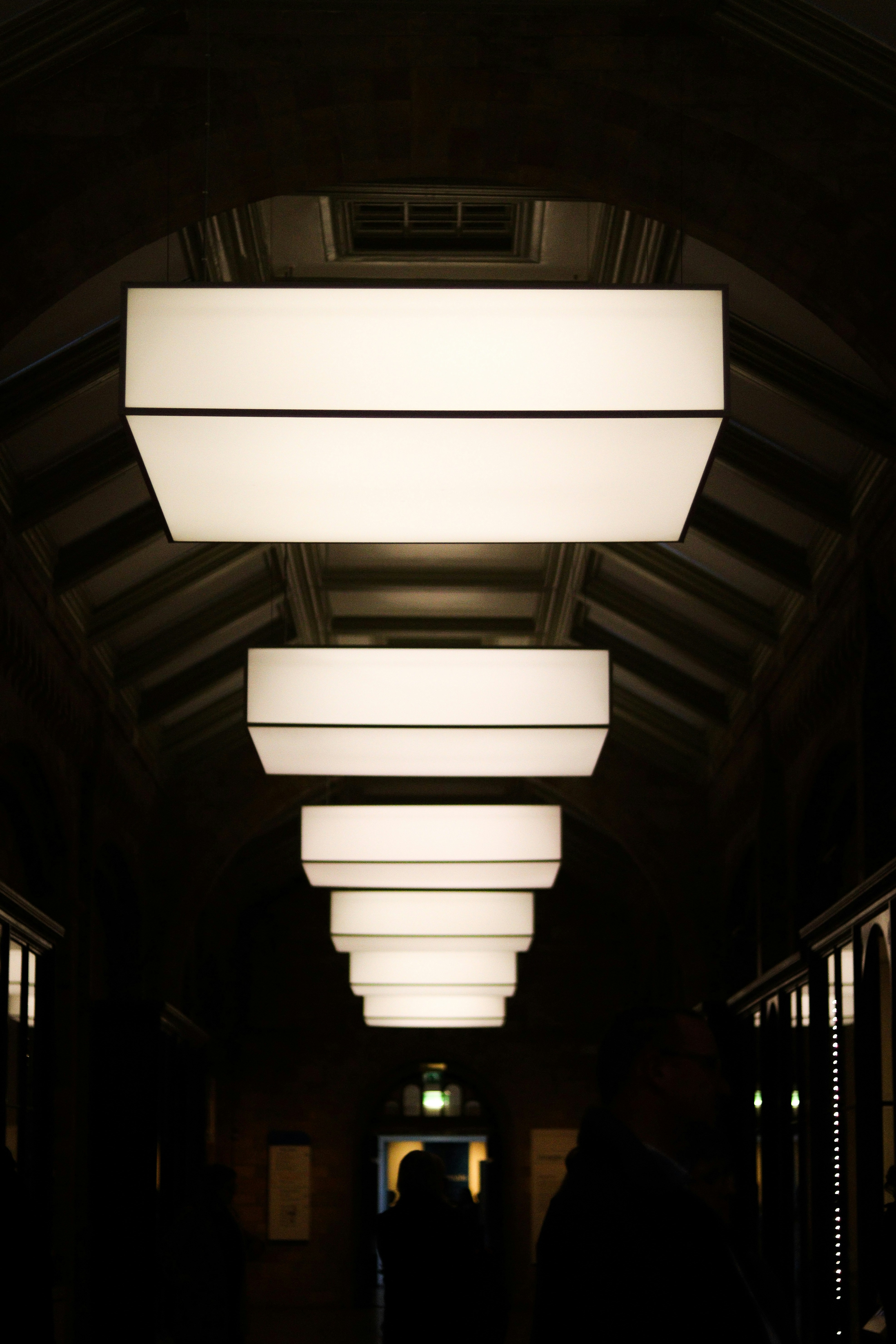 Hanging Lights in a Gothic Corridor